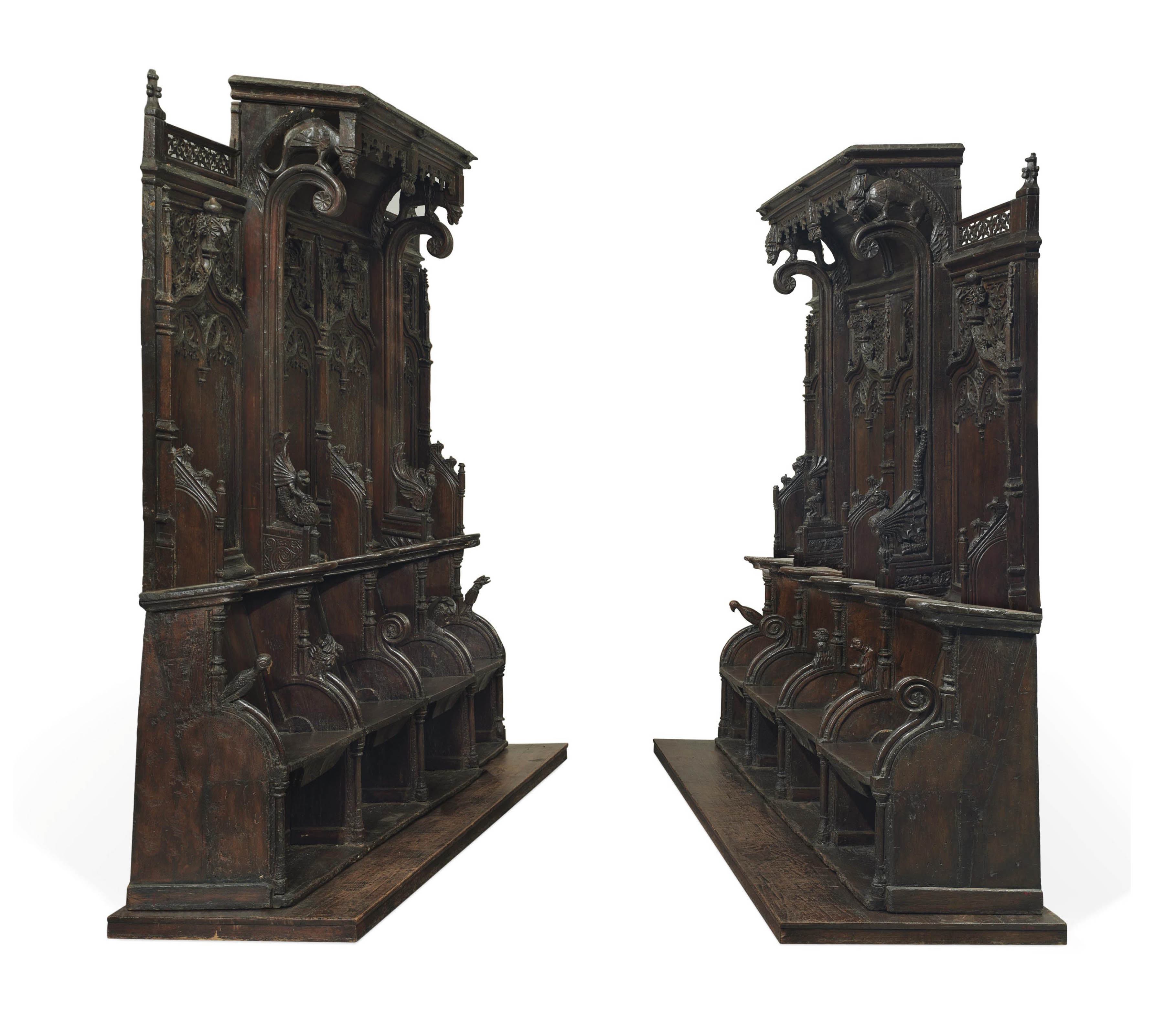 A PAIR OF LATE GOTHIC OAK CHOIR STALLS