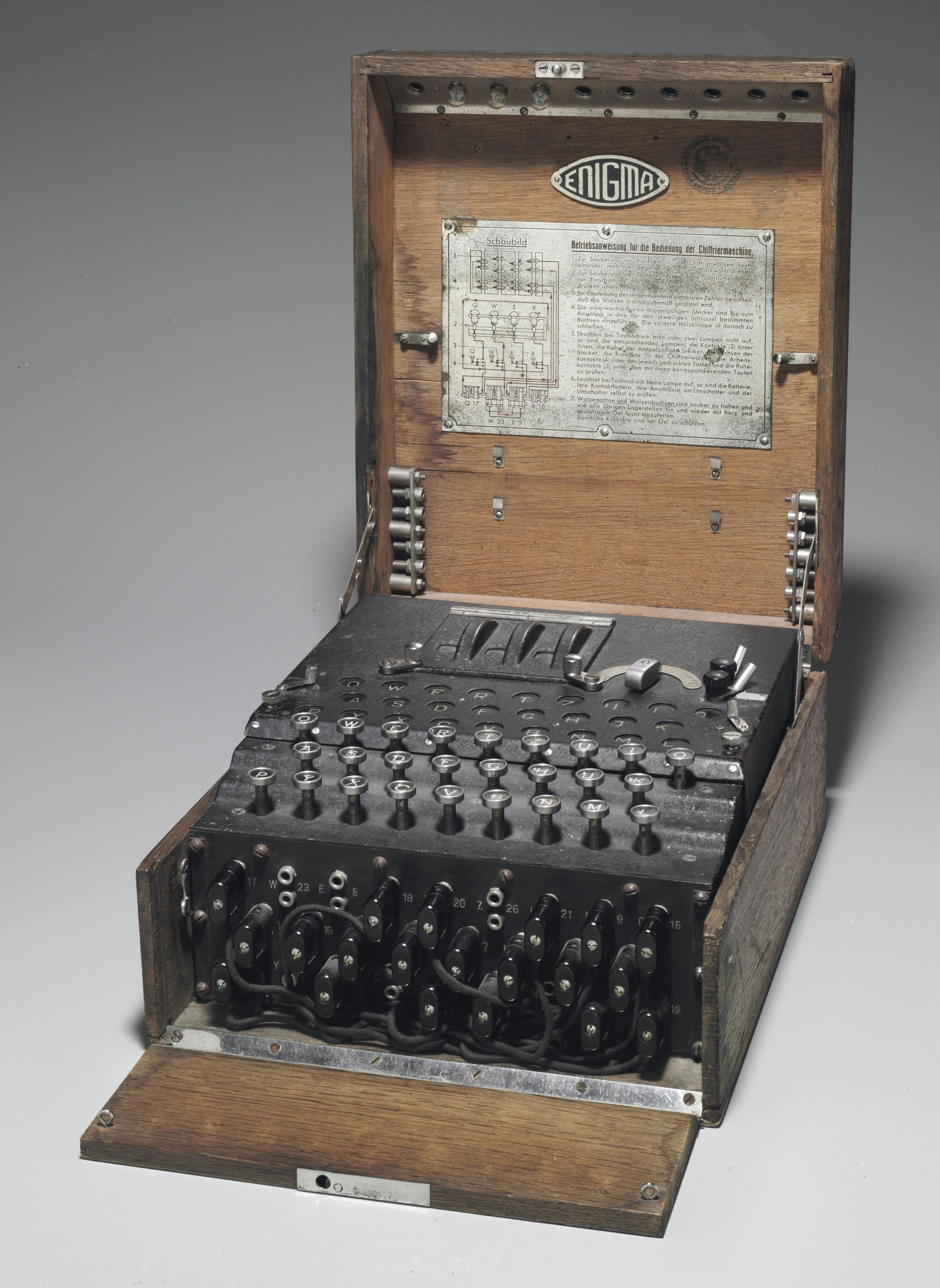 [WORLD WAR II.] ENIGMA MACHINE. A three-rotor Enigma cipher machine, ca ...
