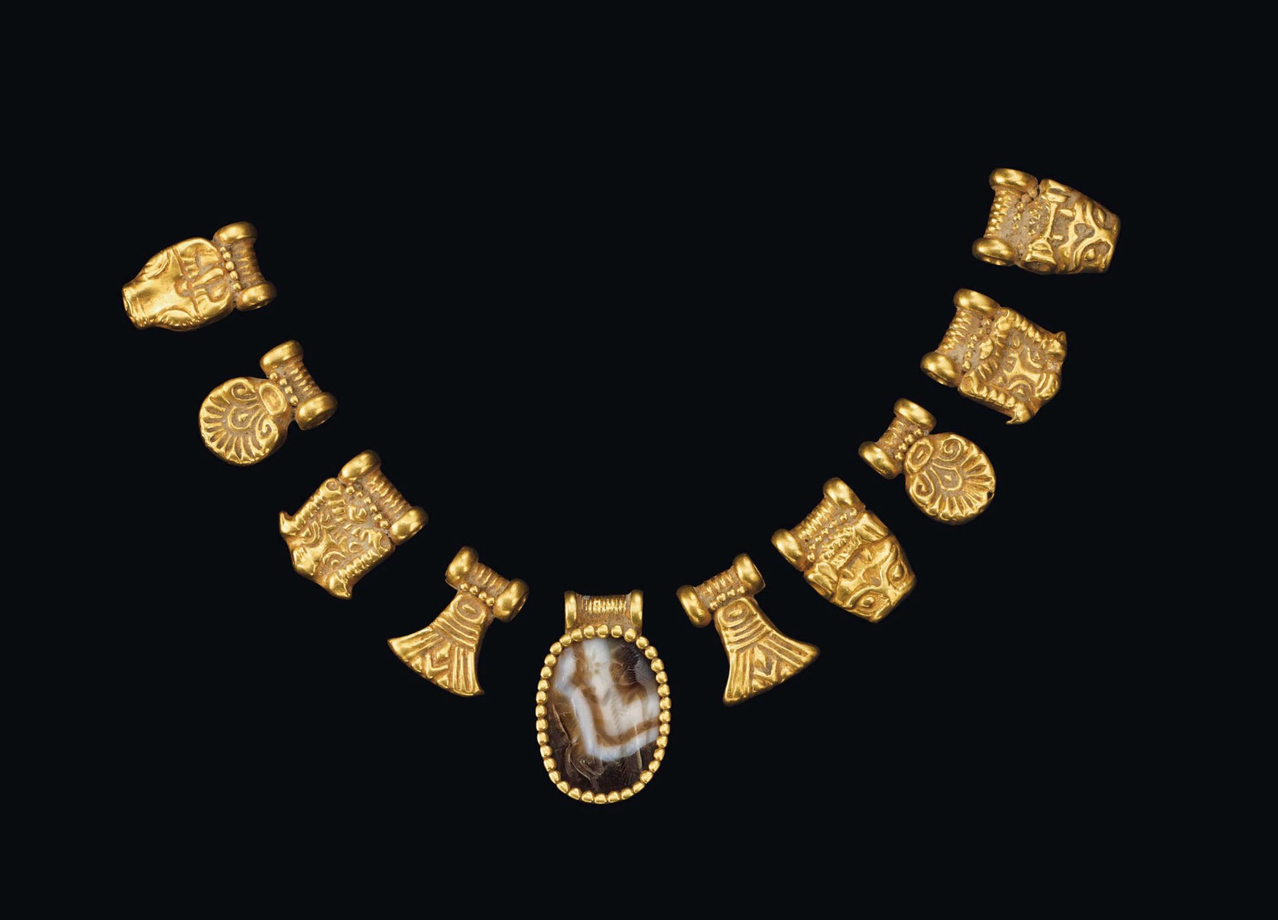 TEN SOUTH ARABIAN GOLD NECKLACE ELEMENTS