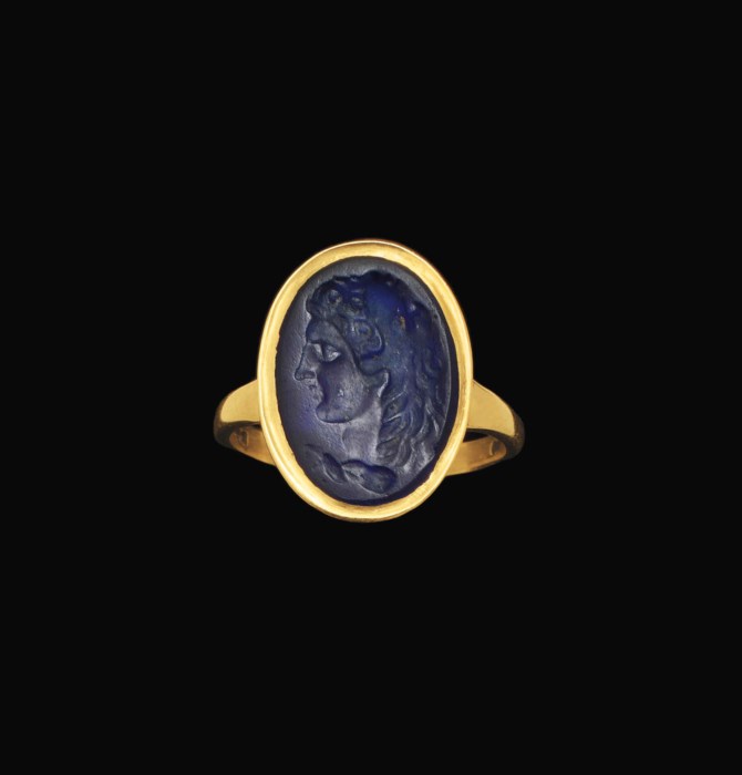 A GREEK BLUE GLASS RINGSTONE , HELLENISTIC PERIOD, CIRCA 1ST CENTURY B ...