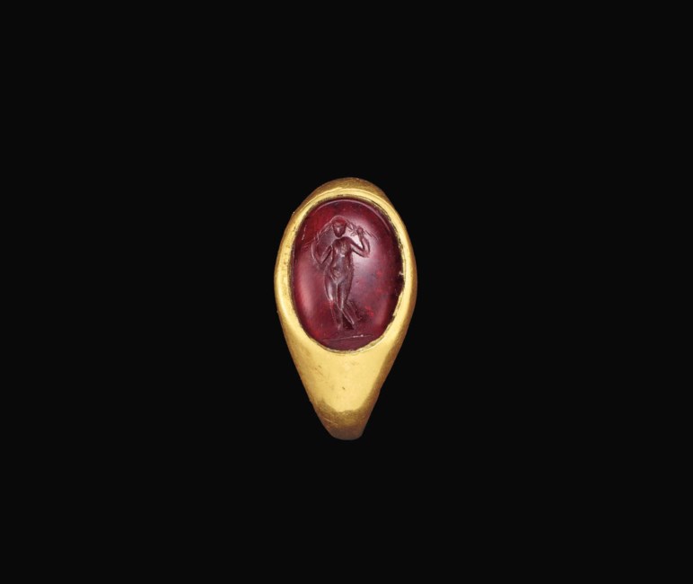 A ROMAN GOLD AND GARNET FINGER RING , CIRCA 1ST-2ND CENTURY A.D ...