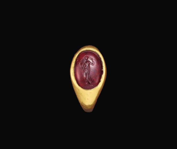 A ROMAN GOLD AND GARNET FINGER RING , CIRCA 1ST-2ND CENTURY A.D ...