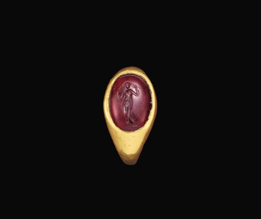 A ROMAN GOLD AND GARNET FINGER RING , CIRCA 1ST-2ND CENTURY A.D ...