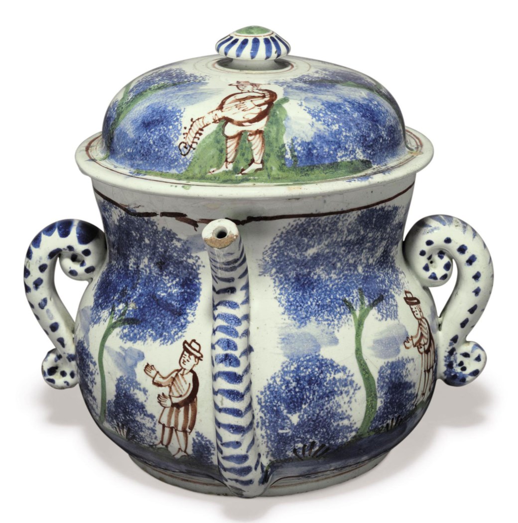 AN ENGLISH DELFT POLYCHROME POSSET-POT AND COVER