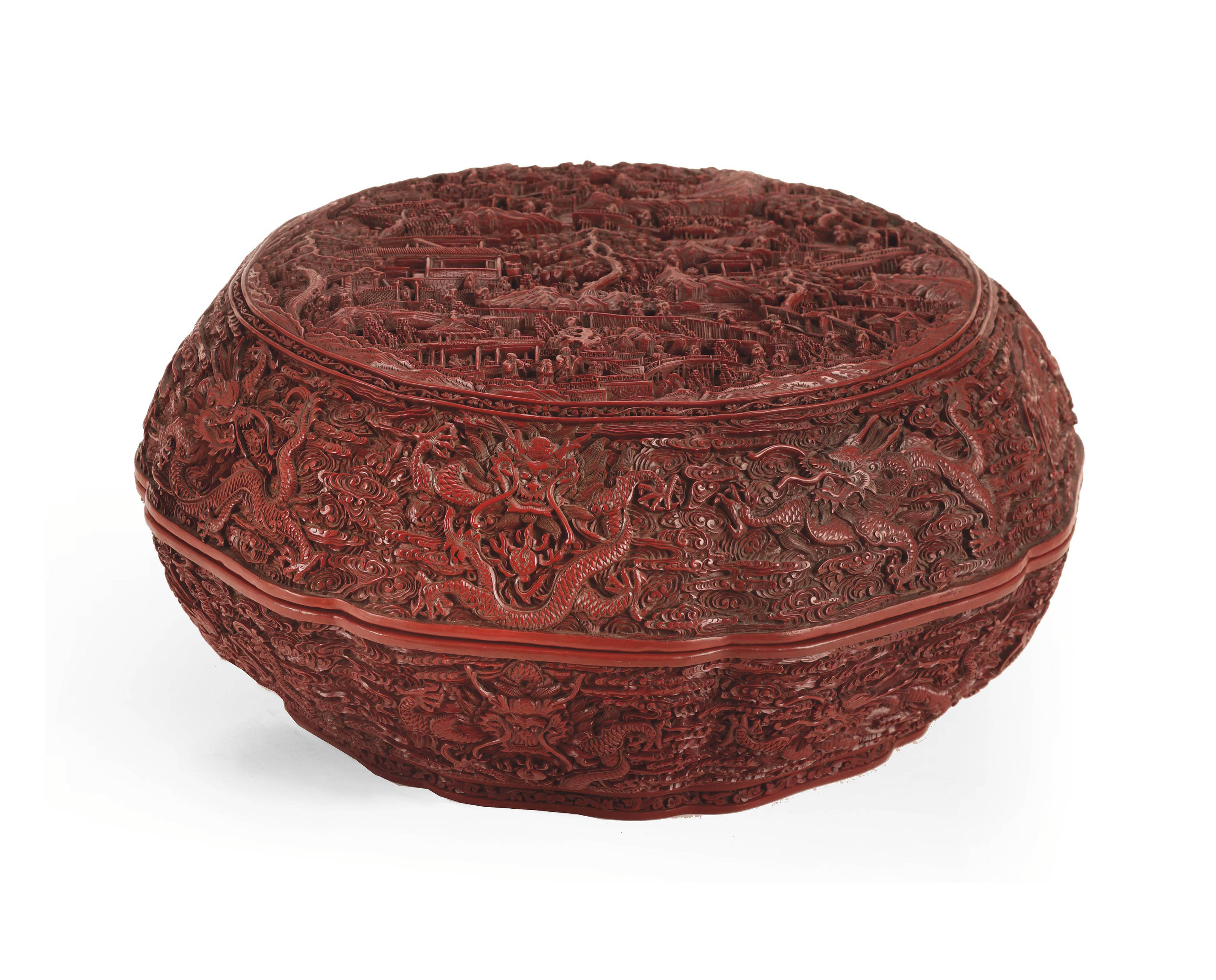 A large Chinese cinnabar red lacquer circular box and cover