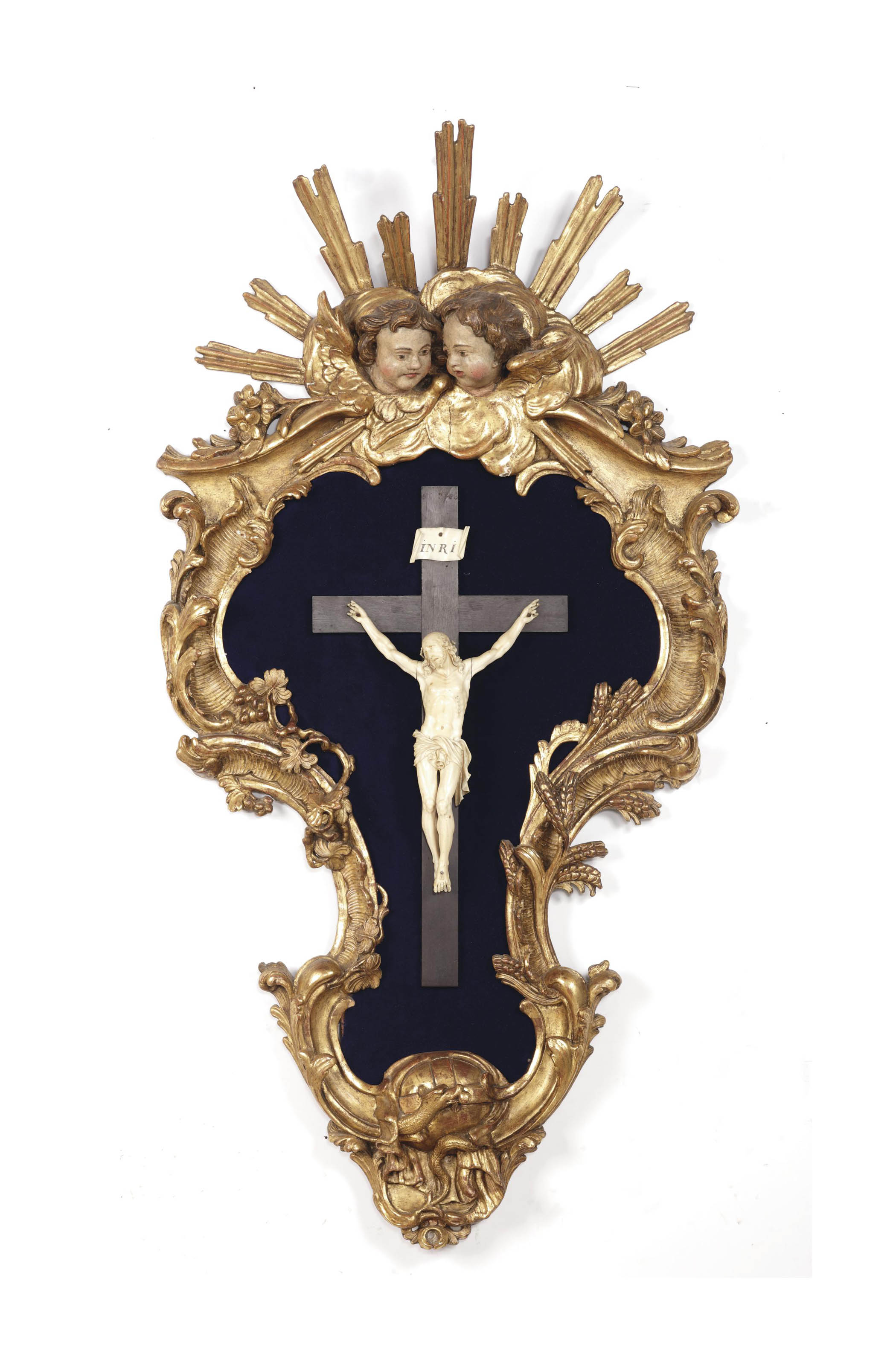 A CARVED IVORY FIGURE OF CHRIST