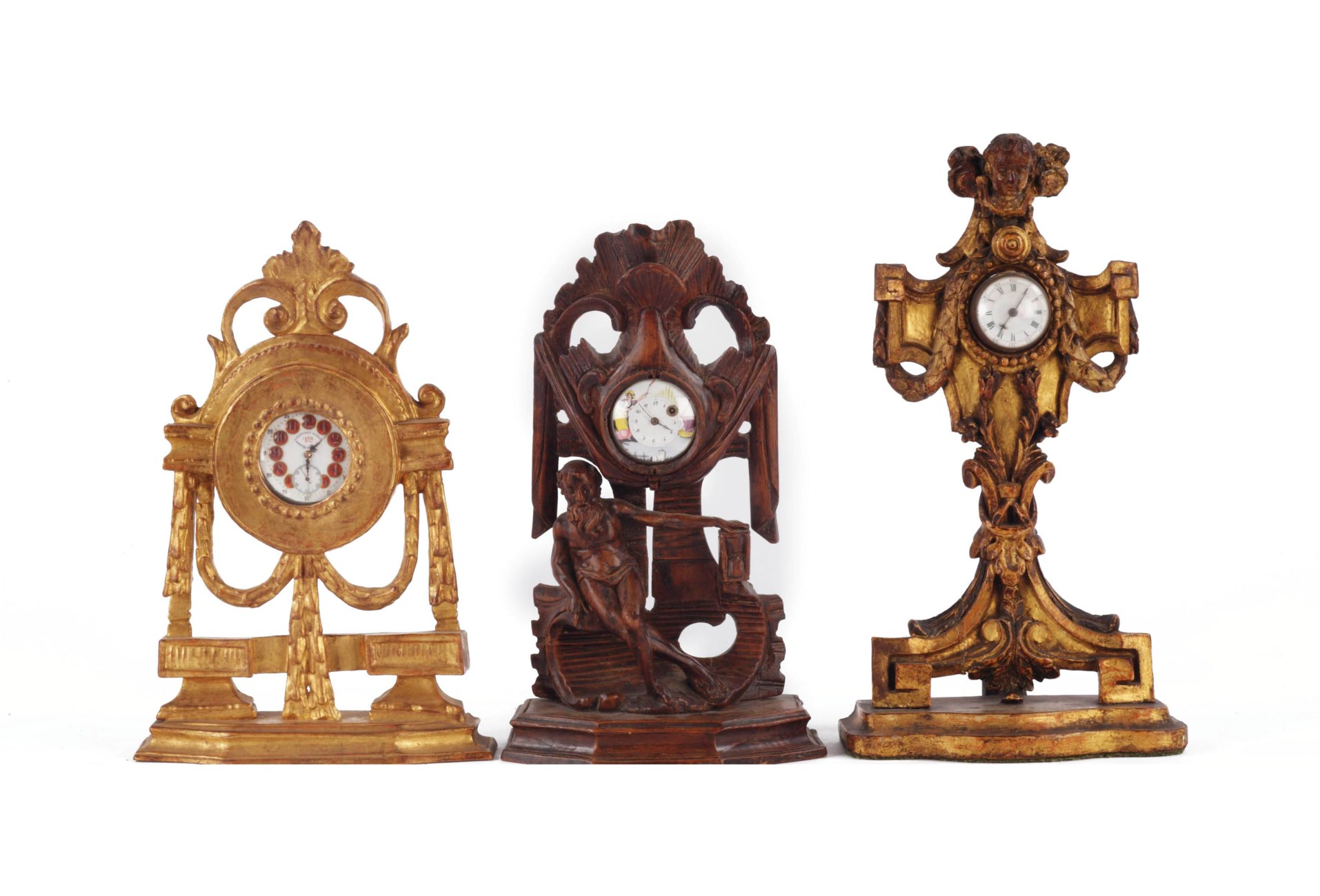 THREE CARVED WOOD WATCH STANDS