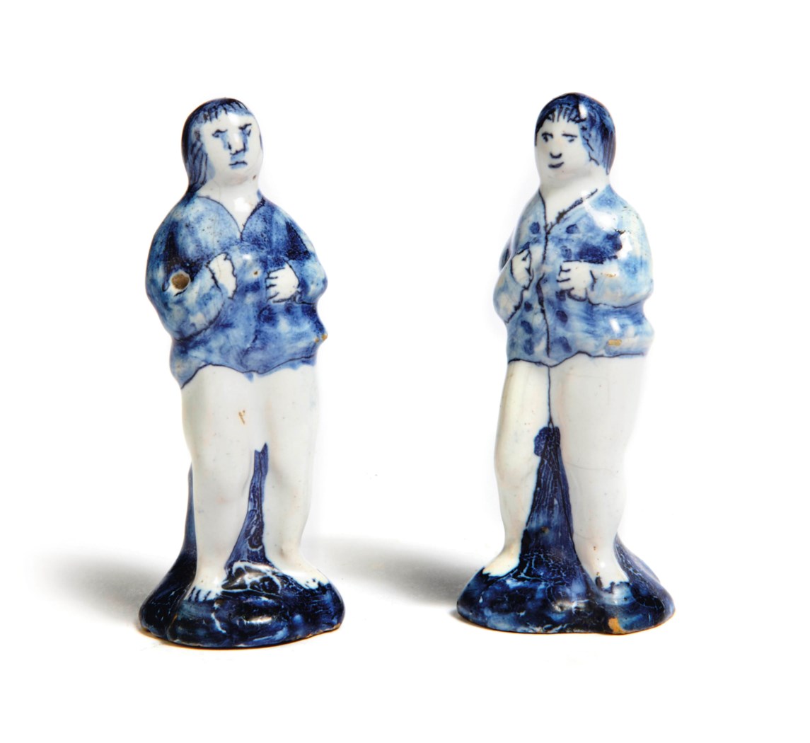 A pair of Dutch Delft blue and white miniature figures , 18TH CENTURY ...