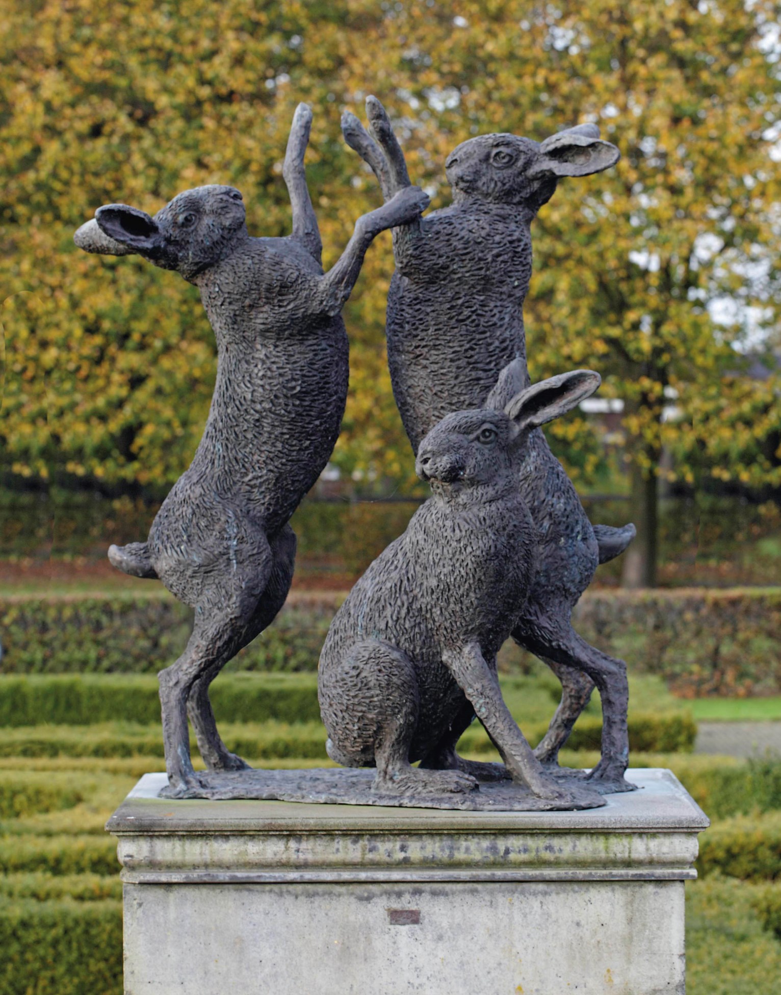 A bronze group of boxing hares , WONG LUN HING (B. 1921), SECOND HALF ...