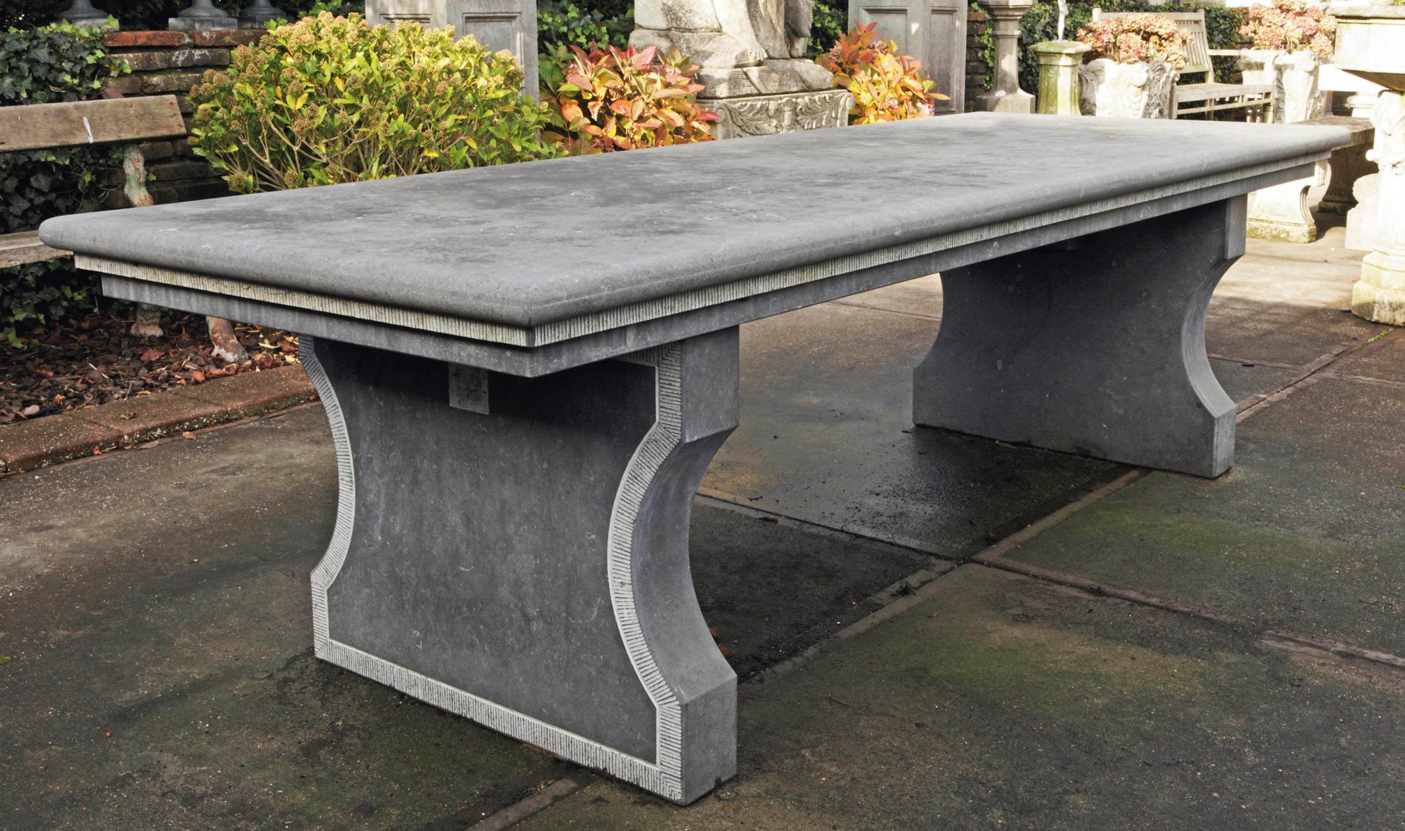 A carved bluestone table