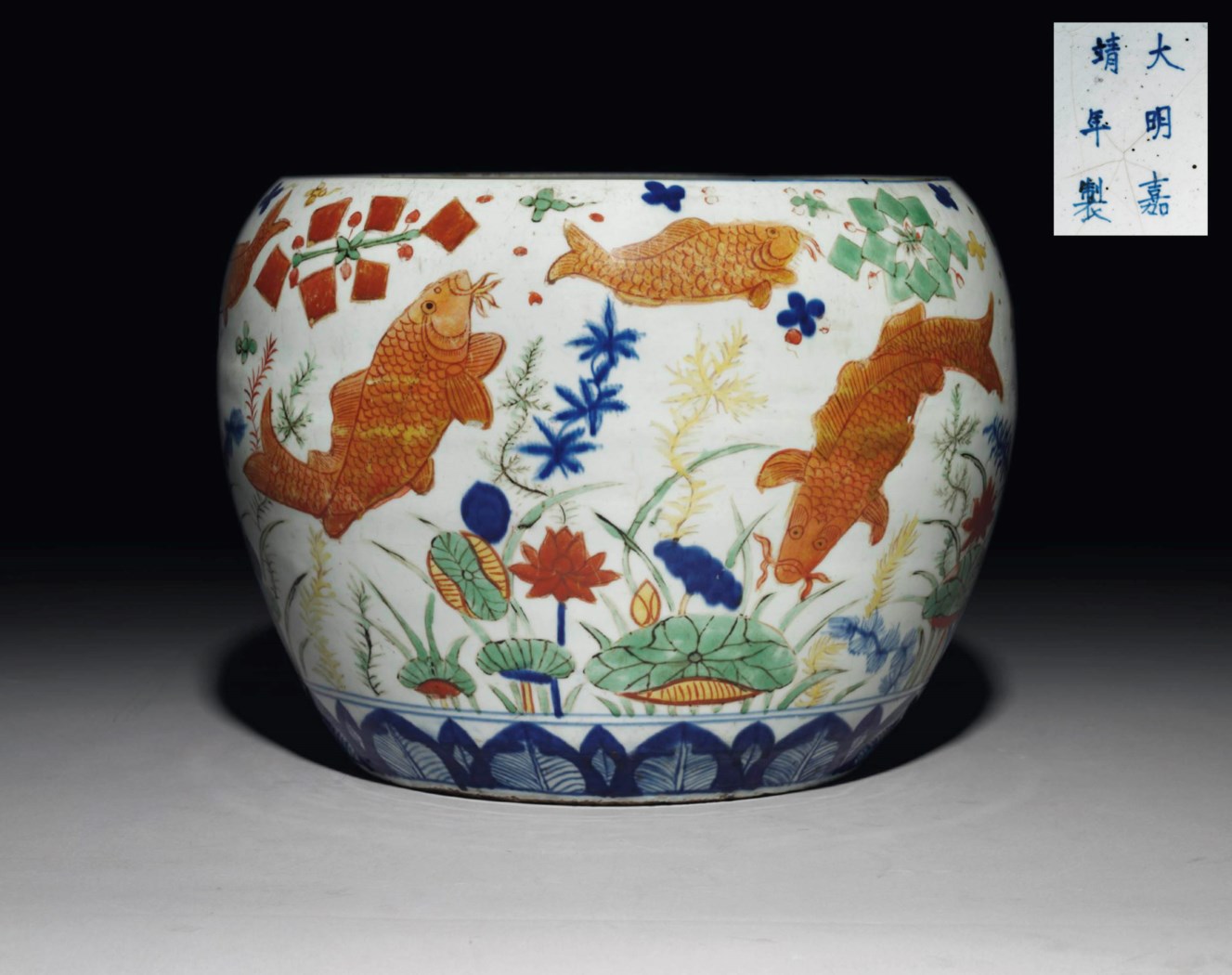 A RARE LARGE WUCAI 'FISH' JAR , JIAJING UNDERGLAZE BLUE SIX-CHARACTER ...