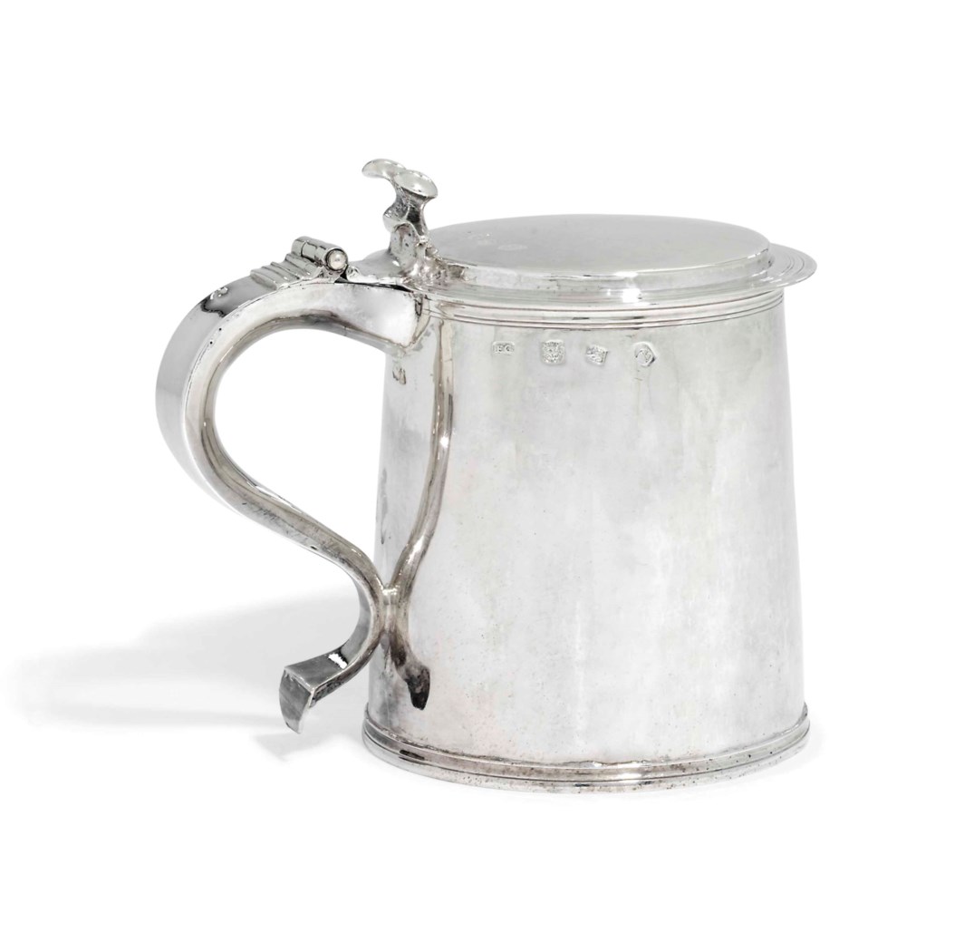 A CHARLES II SILVER TANKARD