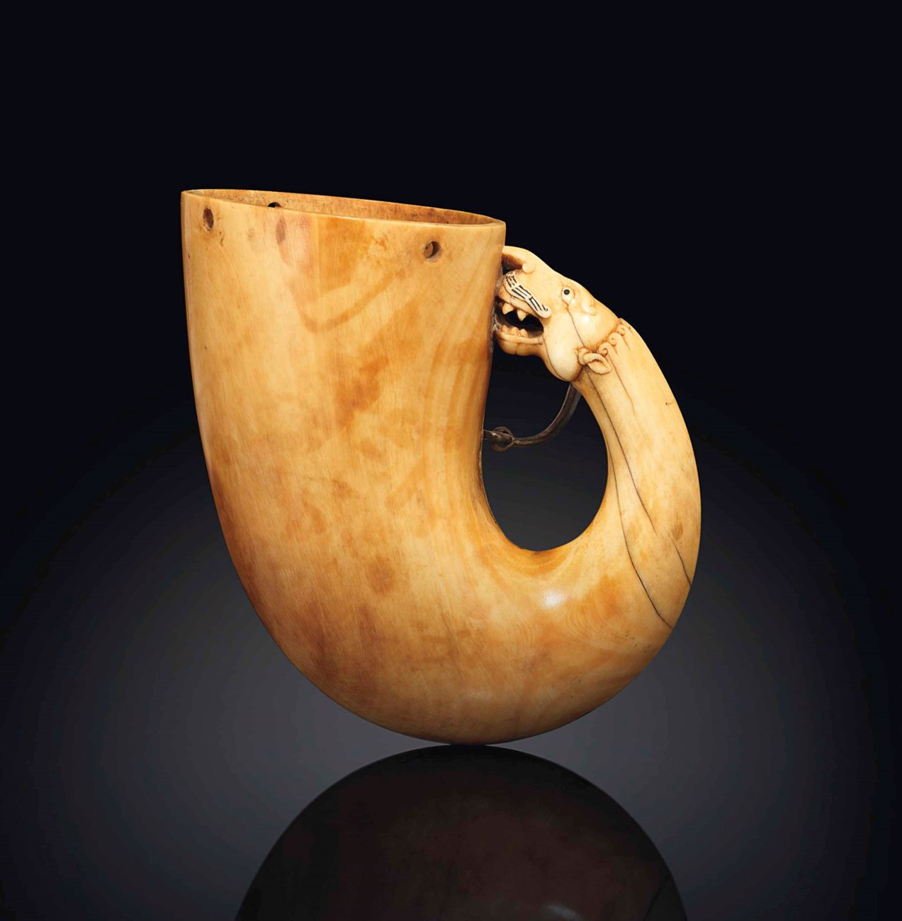 A CARVED IVORY POWDER HORN , MUGHAL INDIA, 17TH CENTURY | Christie's