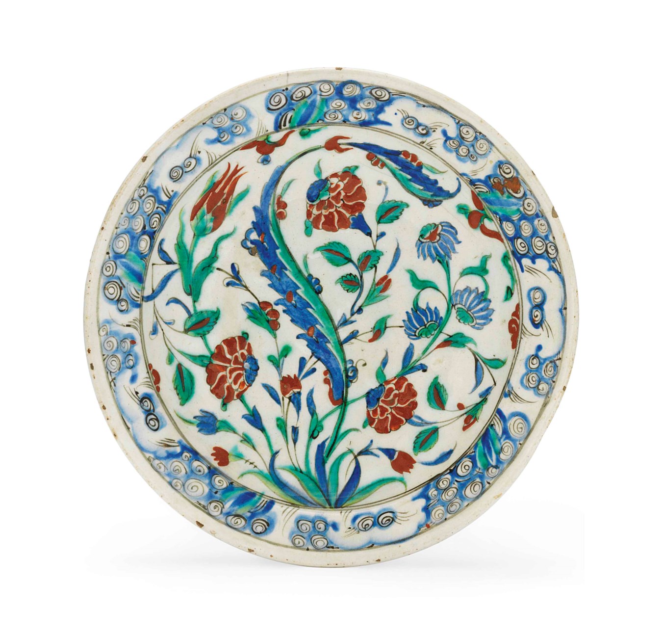 AN IZNIK POTTERY DISH , OTTOMAN TURKEY, CIRCA 1580 | Christie's