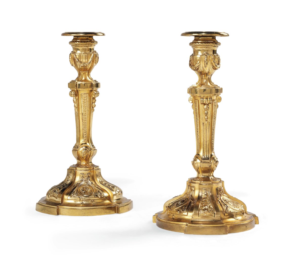 A PAIR OF LATE LOUIS XV ORMOLU CANDLESTICKS , CIRCA 1770 | Christie's