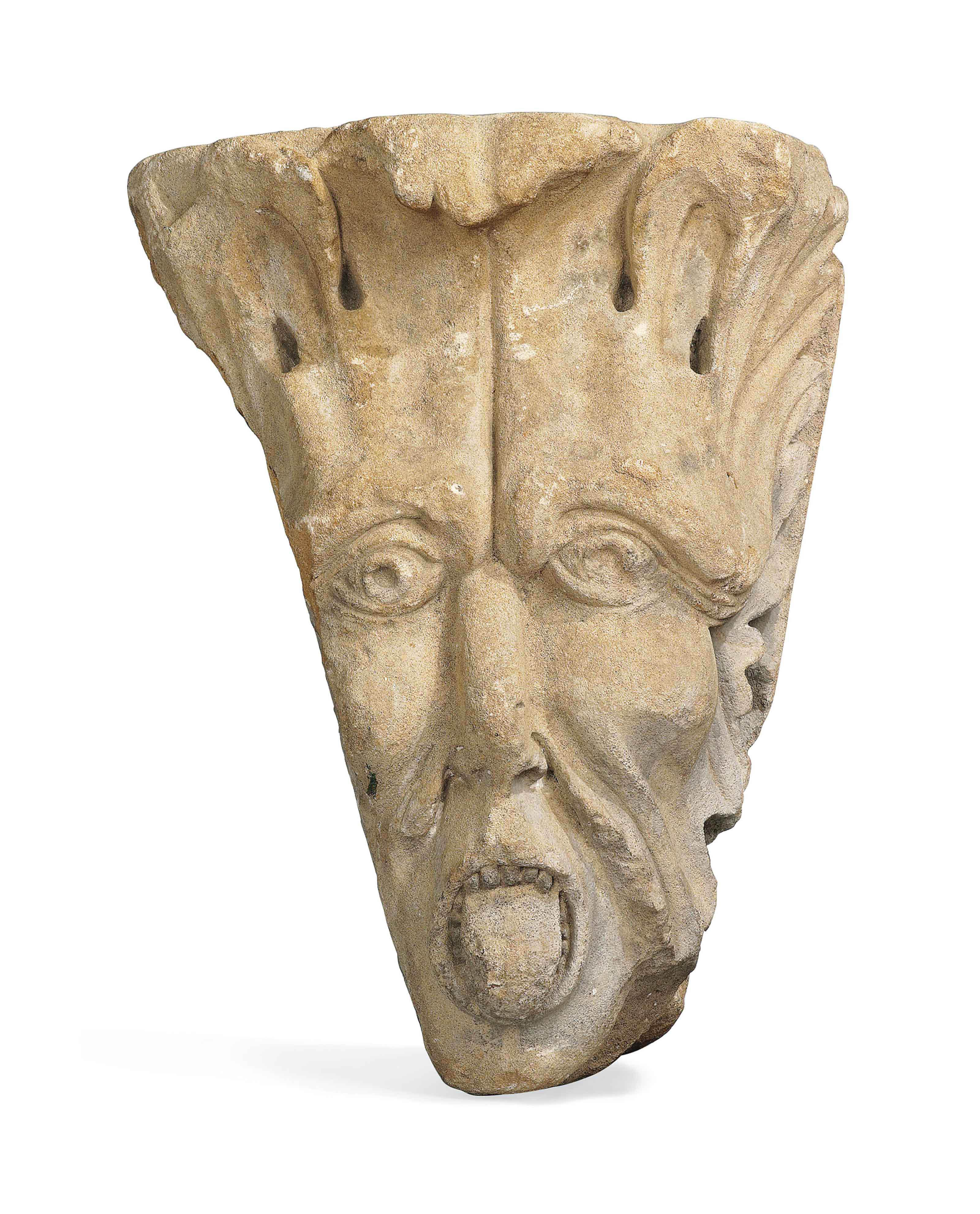 A CARVED STONE GARGOYLE MASK OF MEDIEVAL STYLE , 19TH CENTURY | Christie's