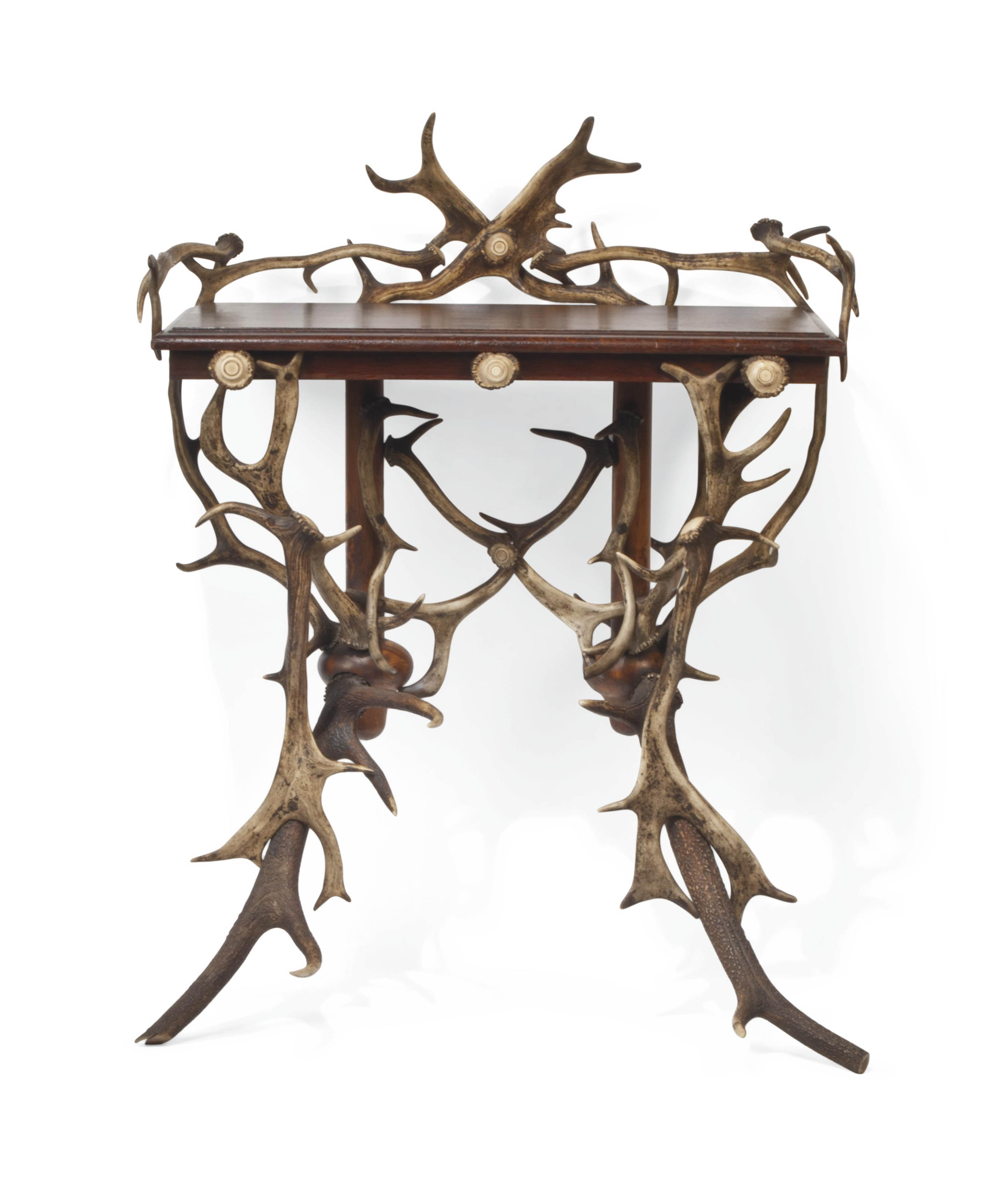 A GERMAN OAK AND ANTLER MOUNTED CONSOLE TABLE