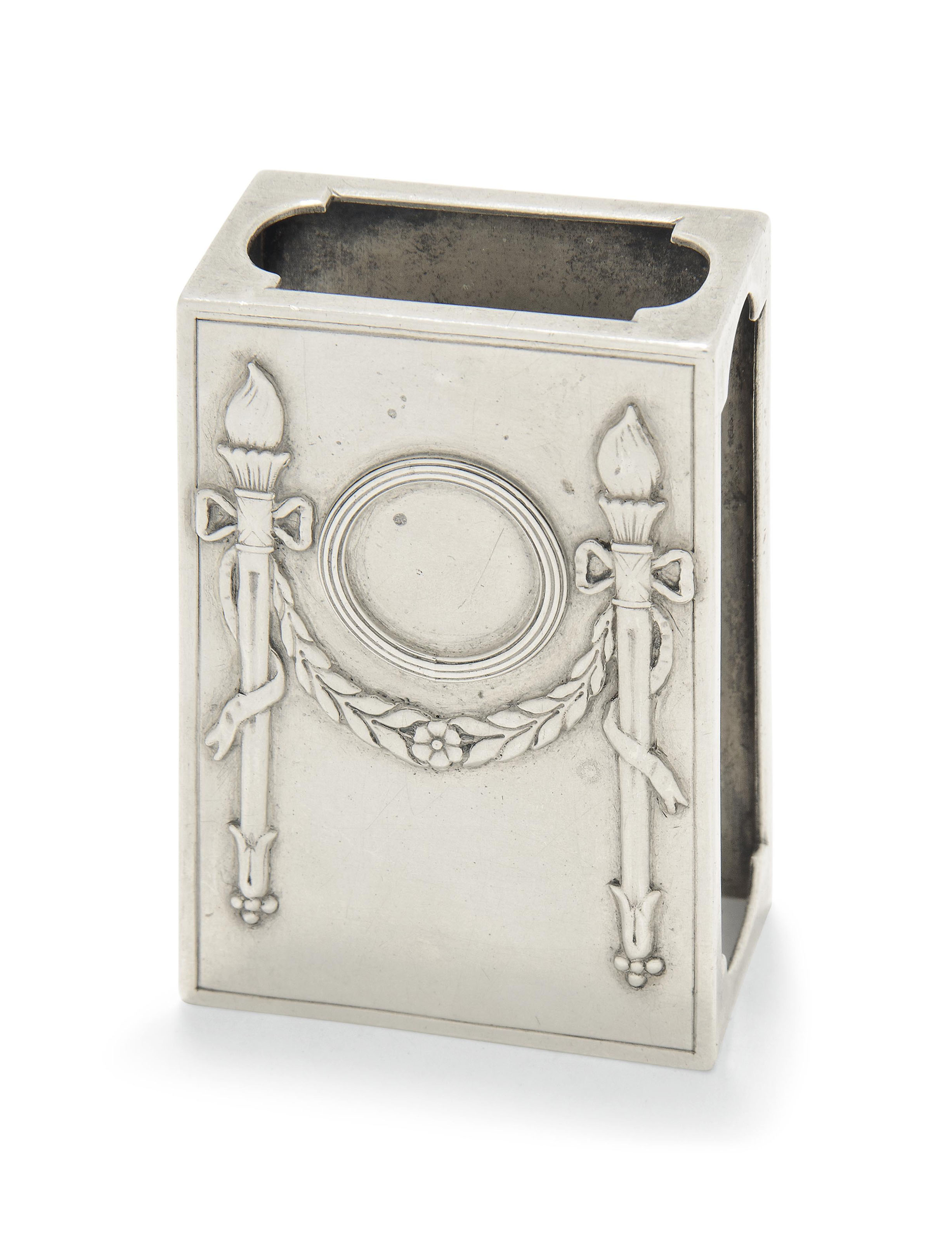 A RUSSIAN SILVER MATCH-BOX HOLDER
