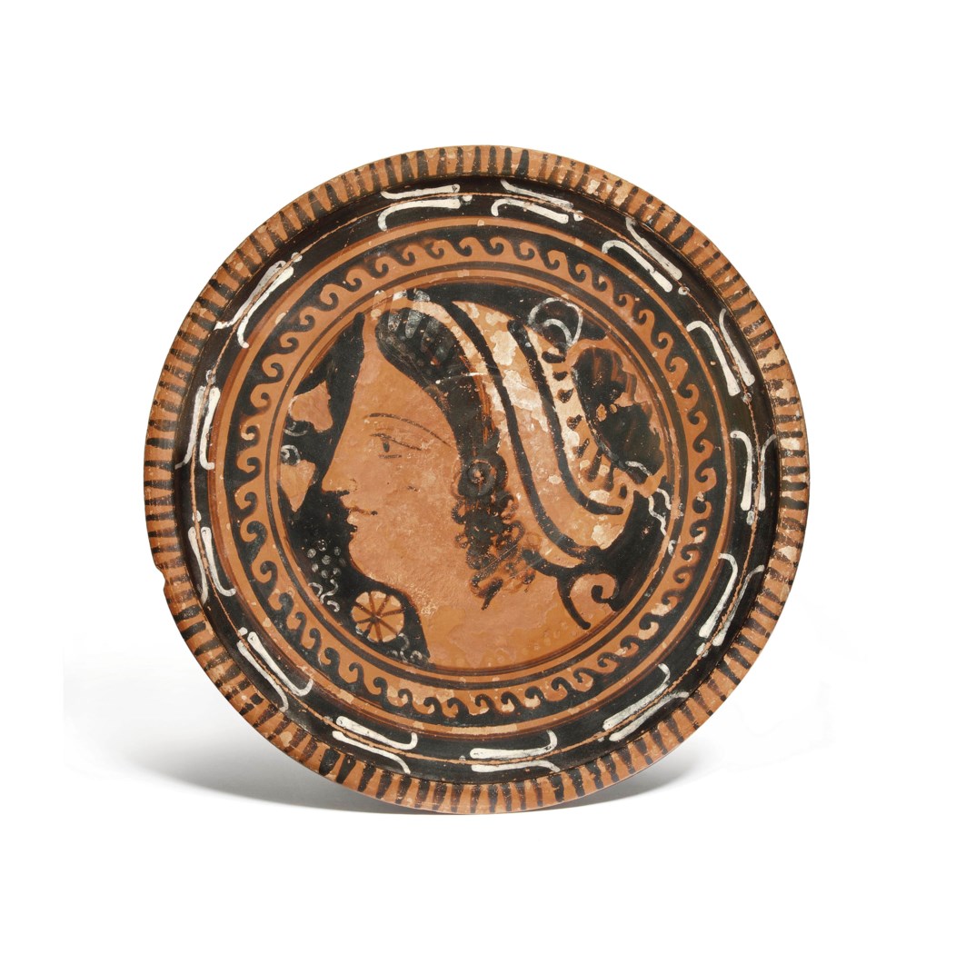 AN APULIAN RED-FIGURED PLATE , ATTRIBUTED TO THE T.P.S. GROUP, CIRCA ...