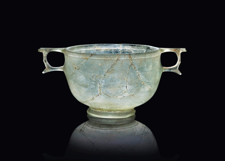A GREEK PALE GREEN GLASS SKYPHOS , HELLENISTIC PERIOD, CIRCA 2ND-MID ...