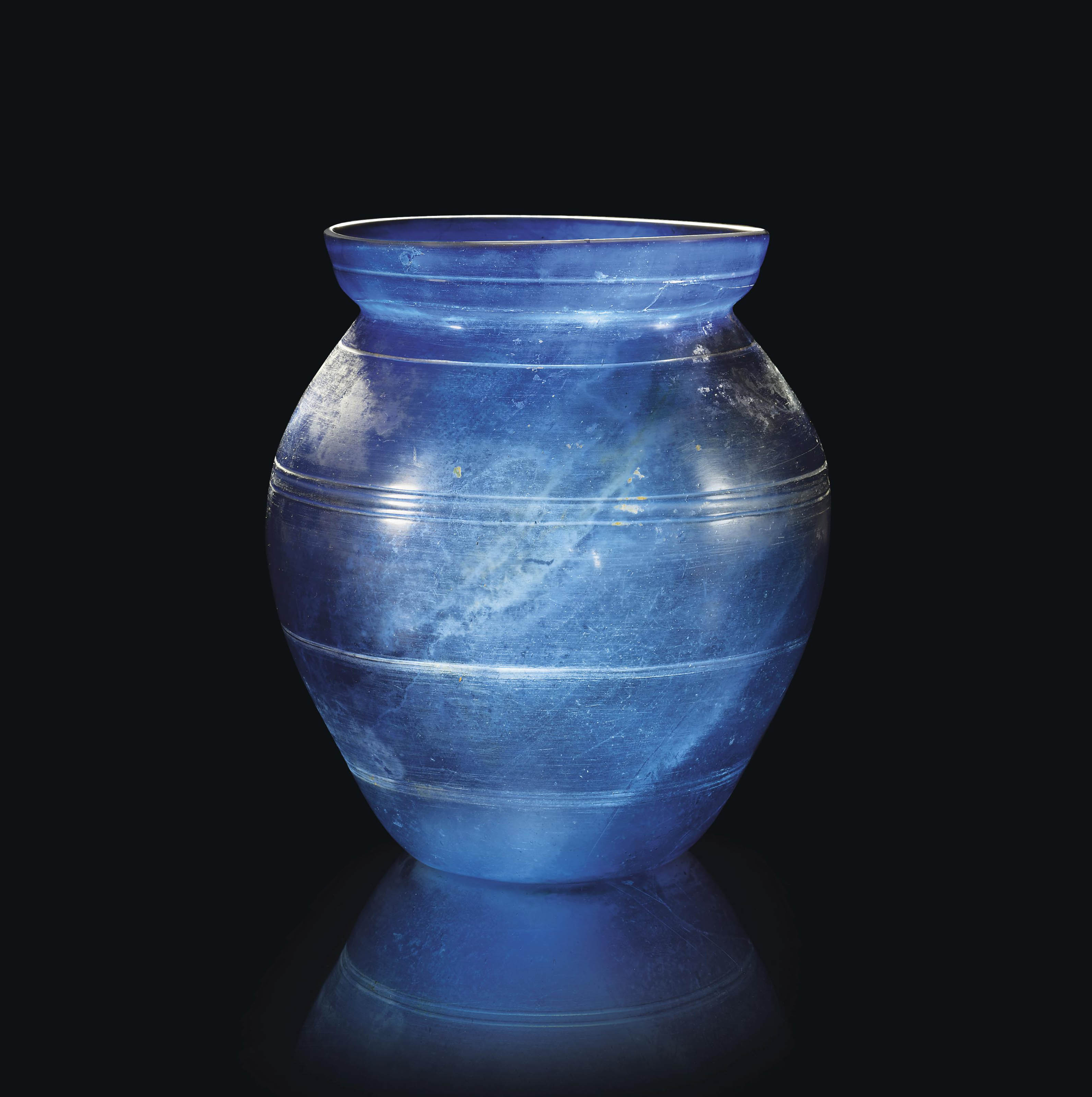 A GREEK PALE GREEN GLASS SKYPHOS , HELLENISTIC PERIOD, CIRCA 2ND-MID ...