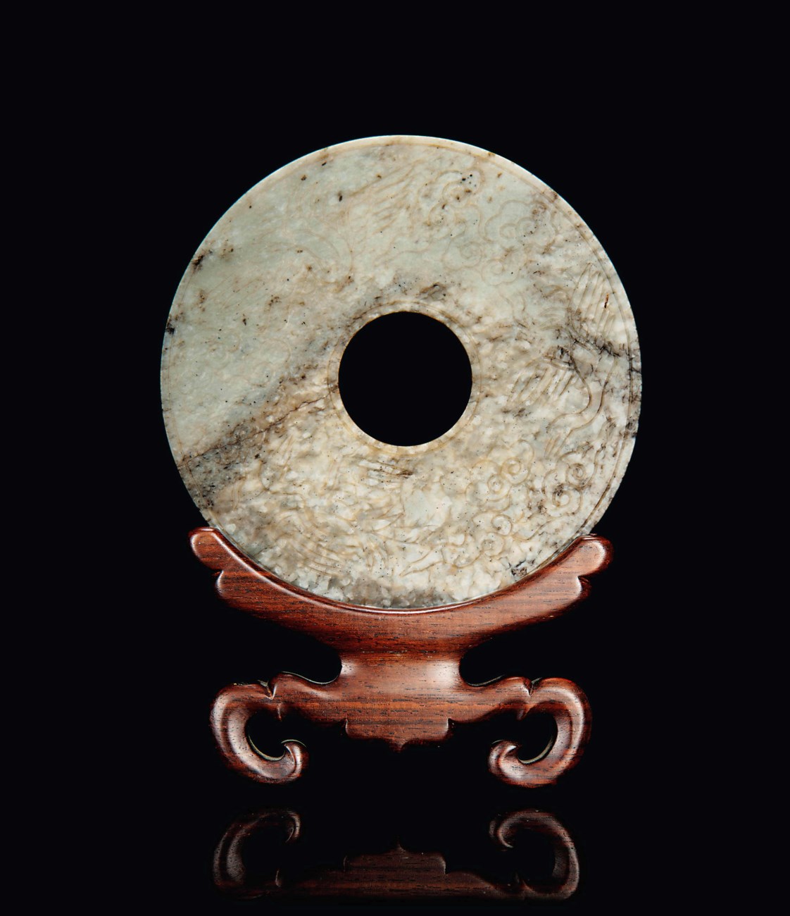 A GREY JADE CARVED DISC, BI , 19TH/20TH CENTURY | Christie's