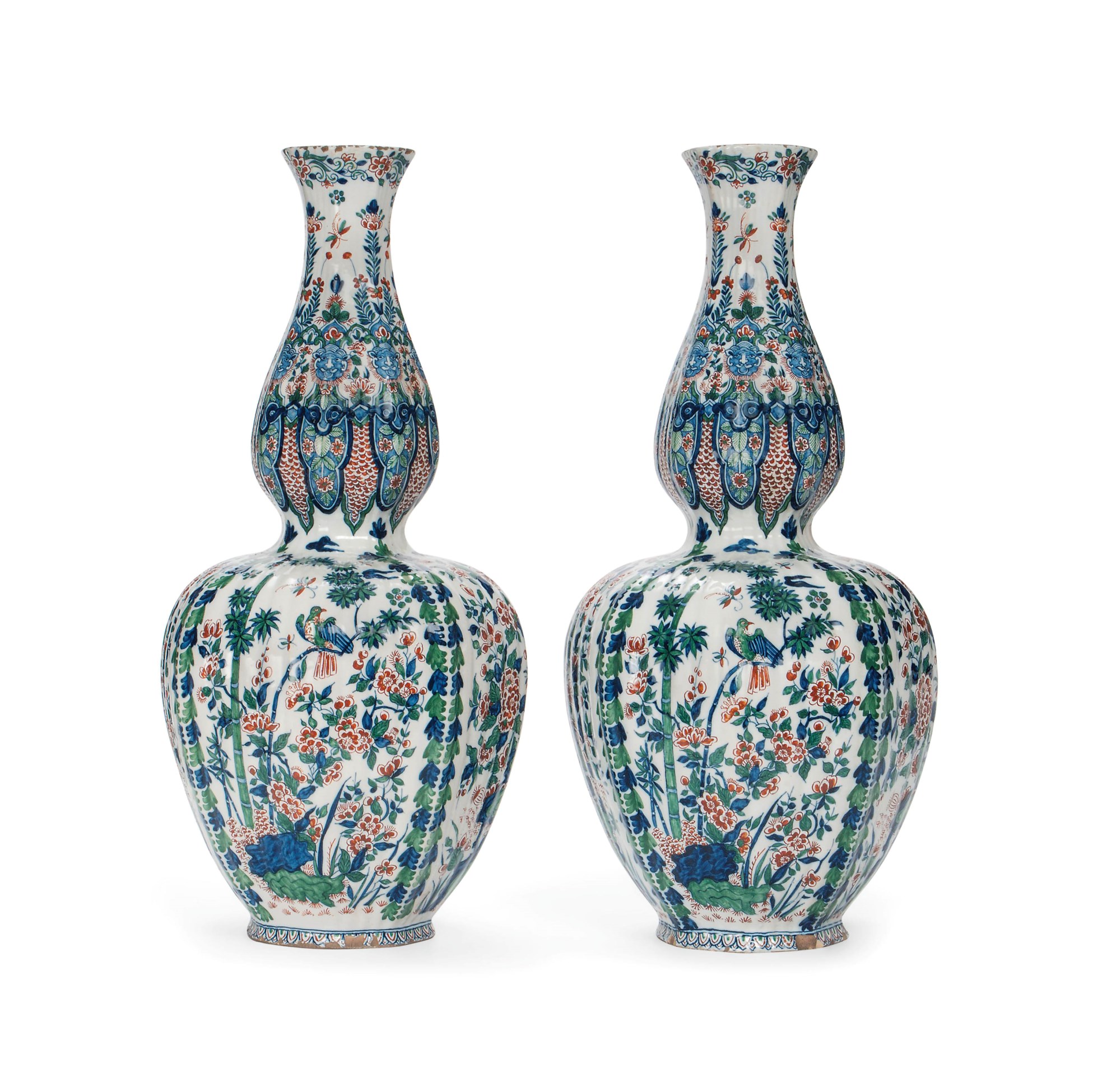 A PAIR OF DUTCH DELFT POLYCHROME VASES
