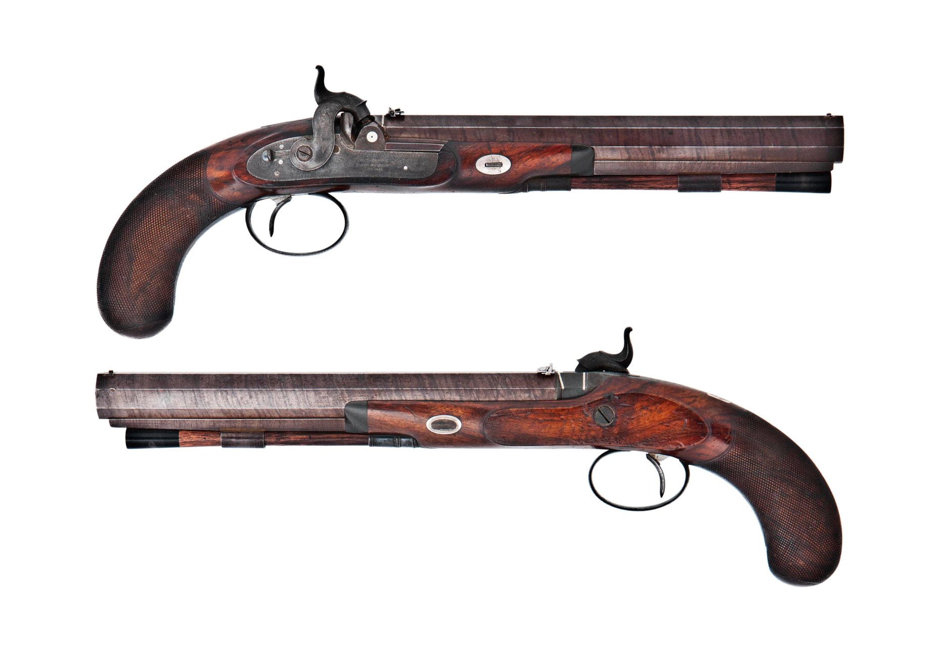 A PAIR OF 50-BORE PERCUSSION DUELLING PISTOLS WITH HIDDEN RIFLING