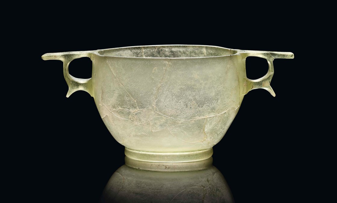 A GREEK PALE GREEN GLASS SKYPHOS , HELLENISTIC PERIOD, CIRCA LATE 2ND ...