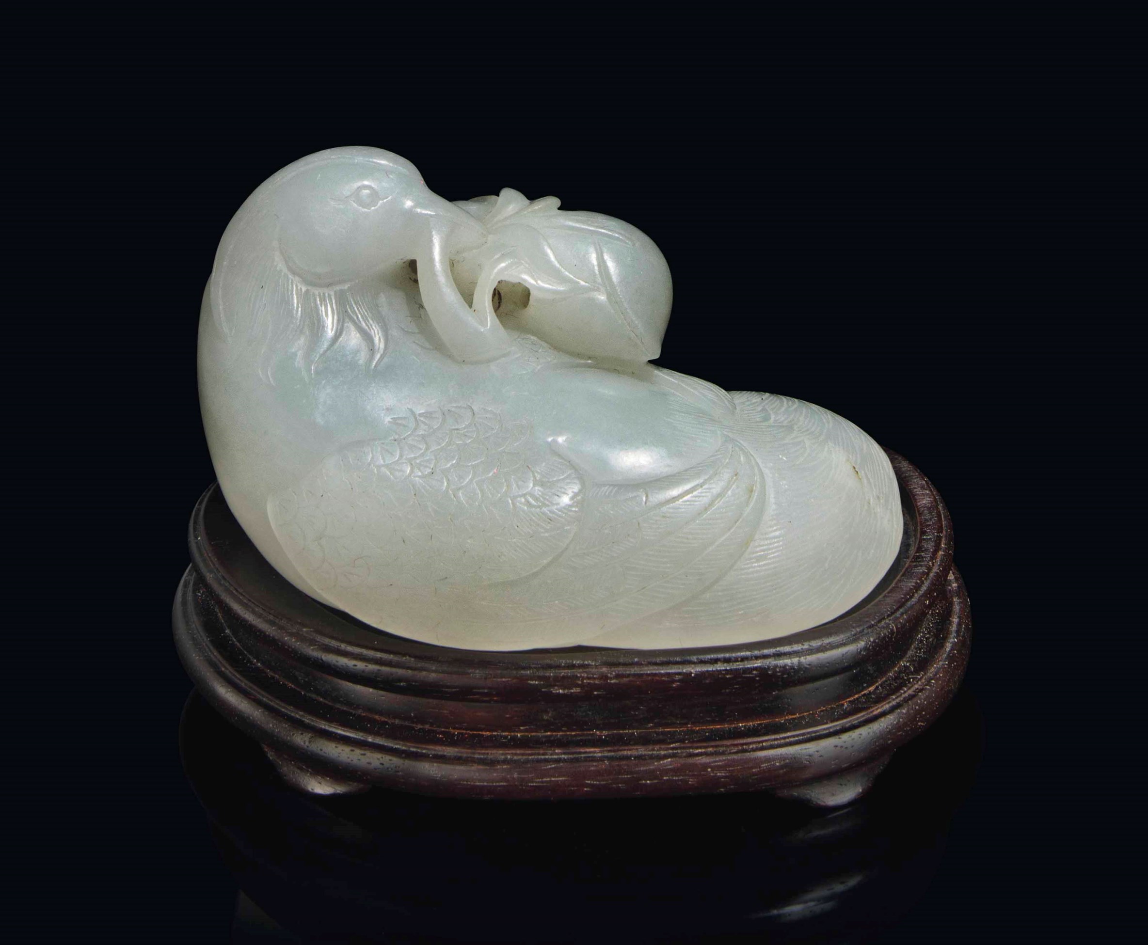 A CHINESE WHITE JADE 'PHOENIX' CARVING | Christie's