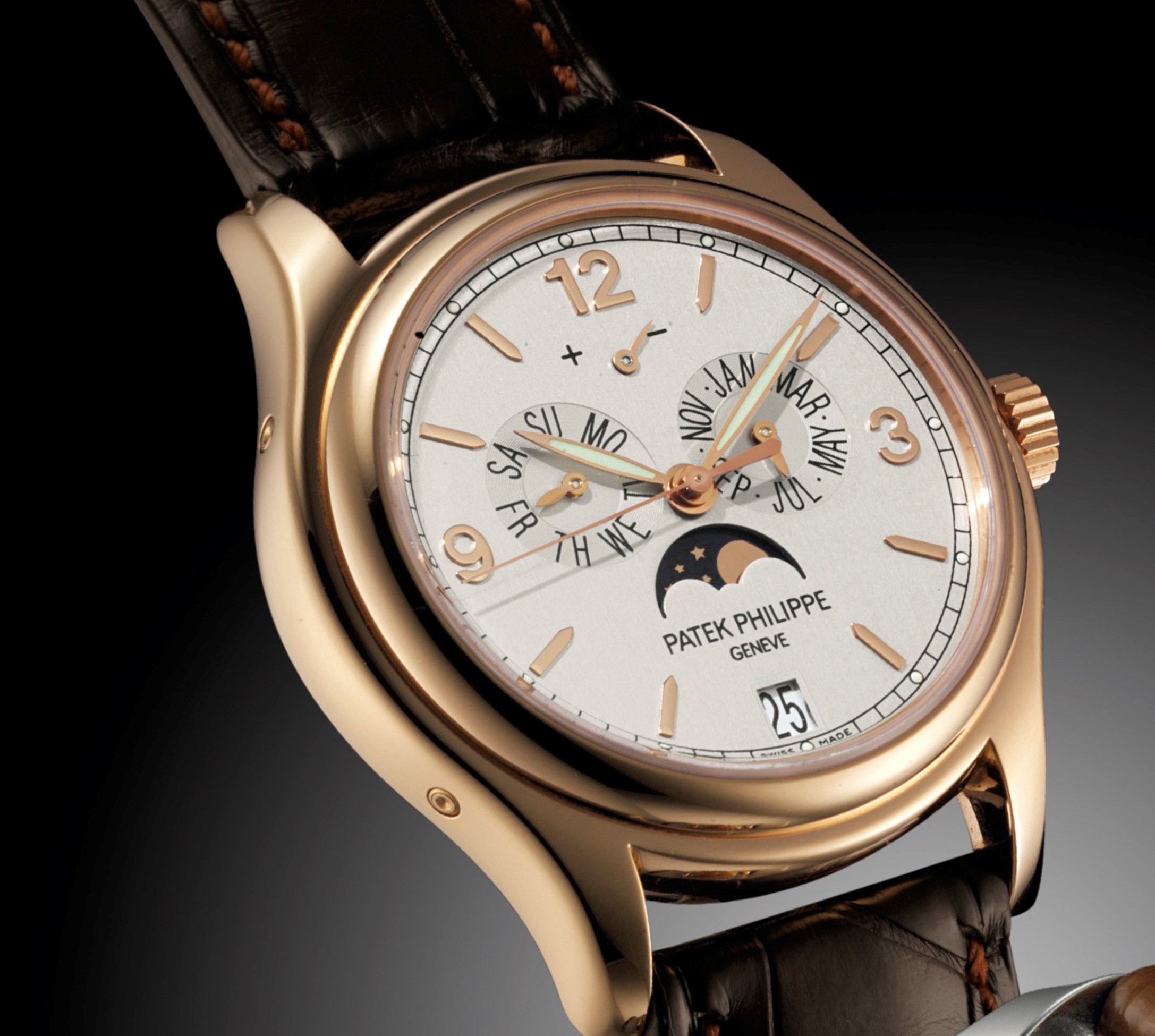 PATEK PHILIPPE. A FINE AND RARE 18K PINK GOLD LIMITED EDITION AUTOMATIC ...