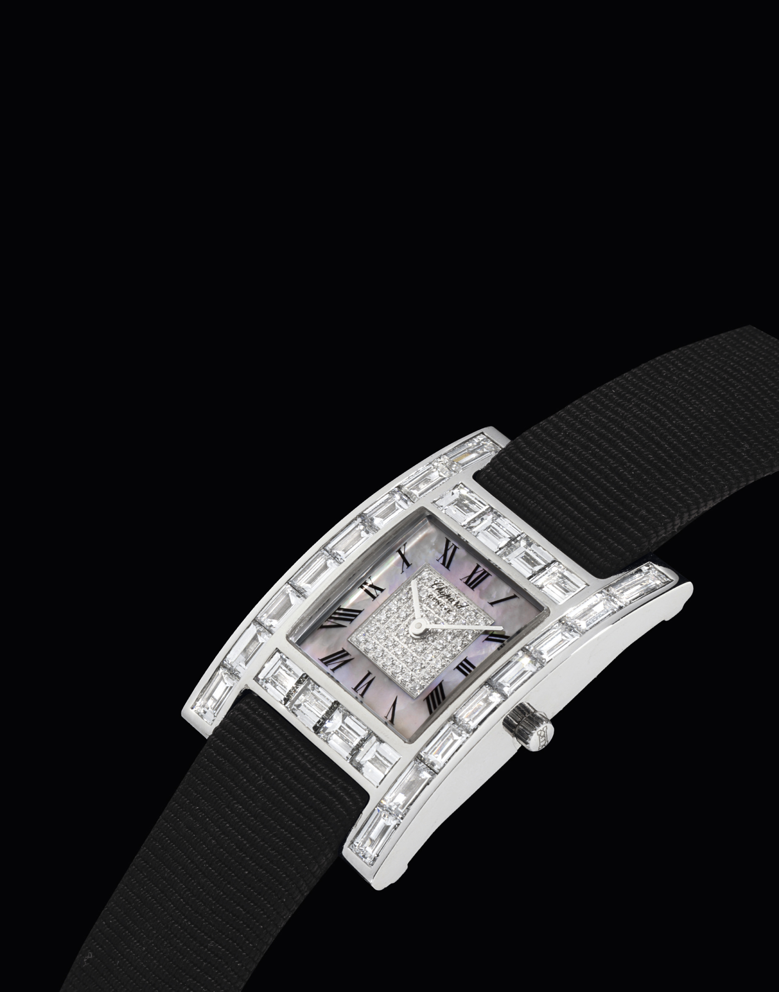 CHOPARD. A LADY'S 18K WHITE GOLD AND DIAMOND-SET RECTANGULAR WRISTWATCH ...