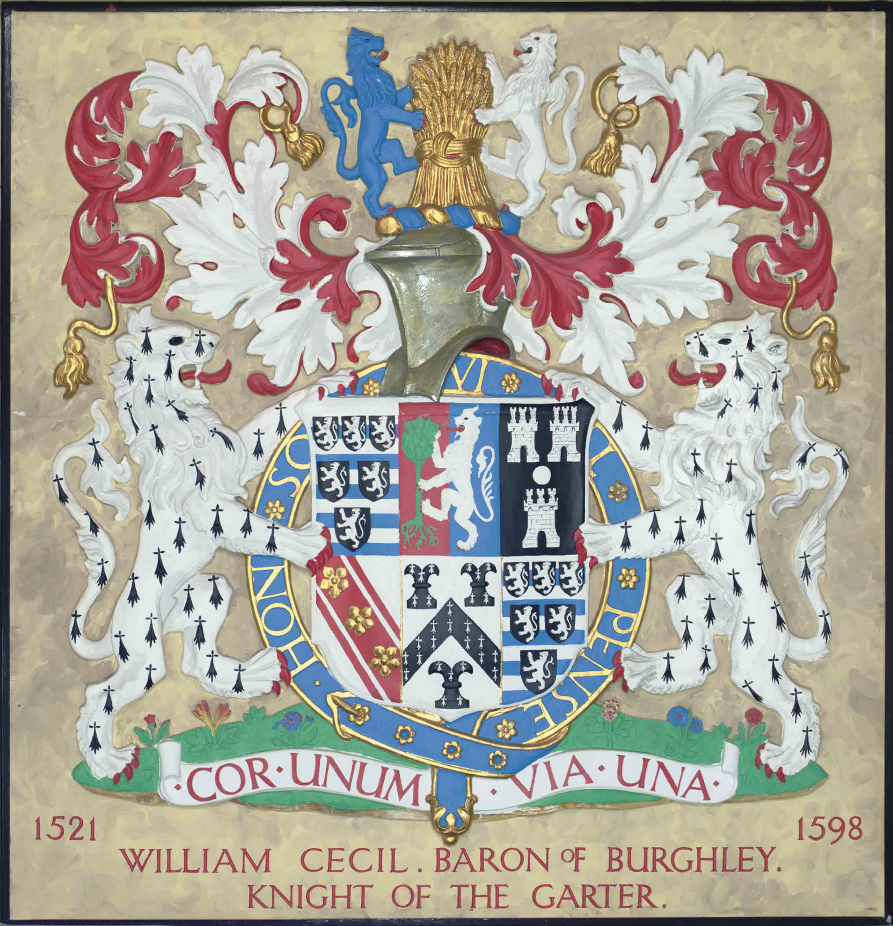 A MASSIVE POLYCHROME DECORATED AND PARCEL-GILT PLASTER HERALDIC PANEL ...