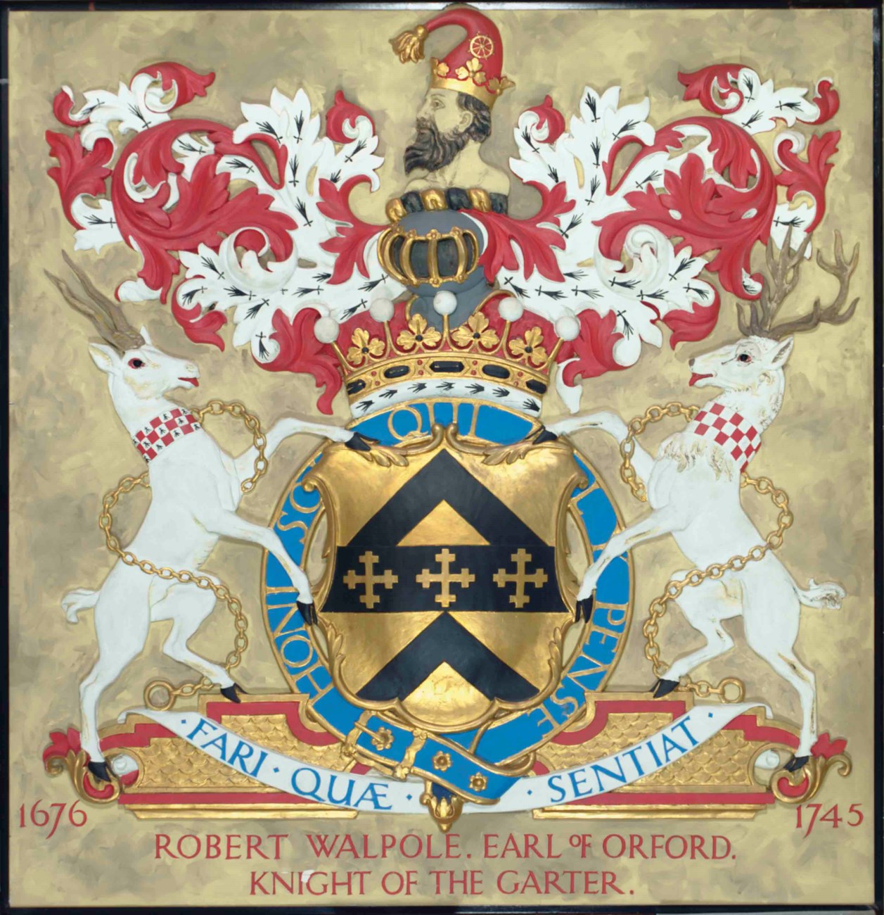 A MASSIVE POLYCHROME DECORATED AND PARCEL-GILT PLASTER HERALDIC PANEL ...