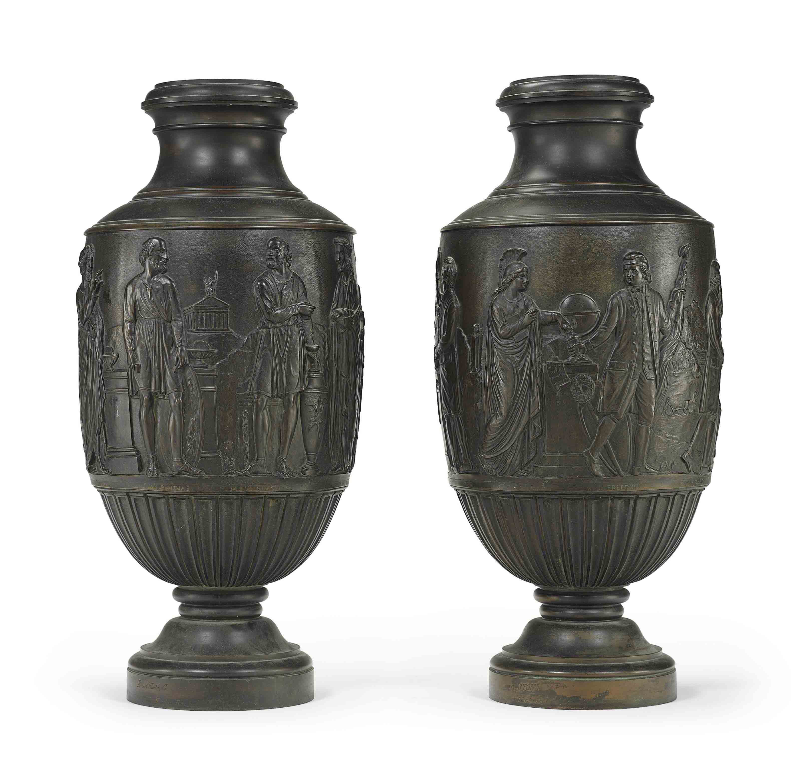 A PAIR OF CAST BRONZE VASES
