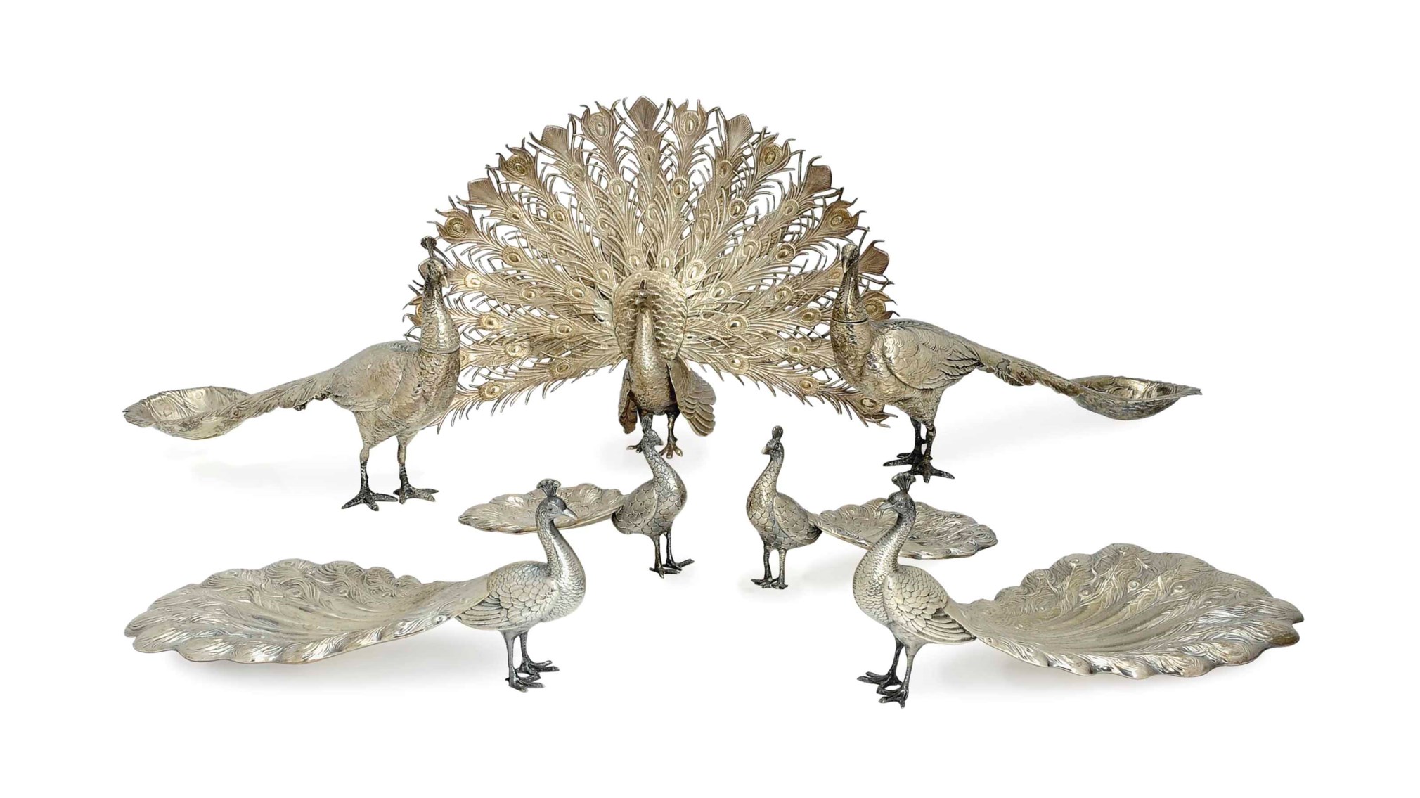 TWO PAIRS OF SILVER PEACOCK-FORM DISHES, A PAIR OF CASTERS, AND ANOTHER ...