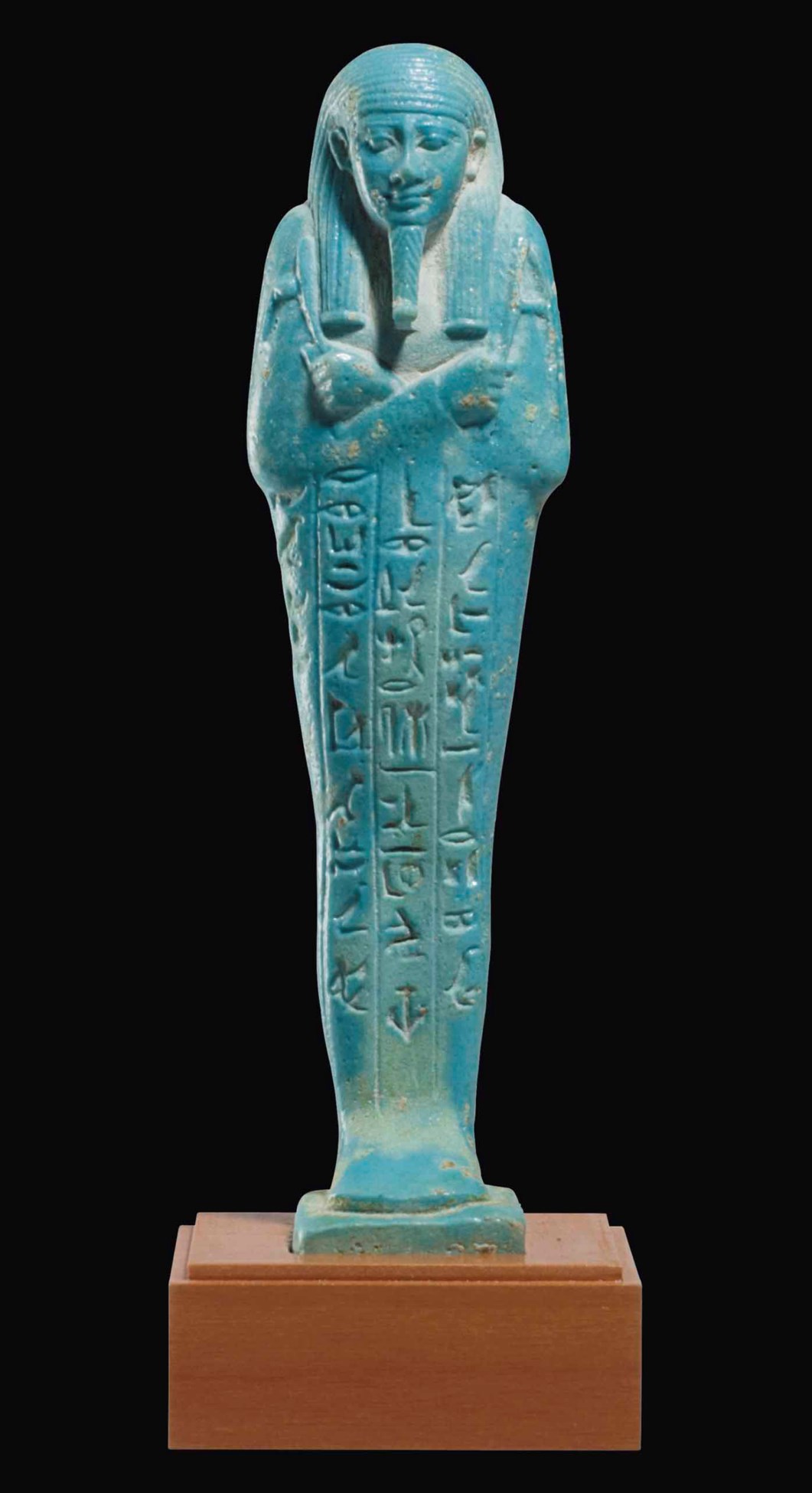 AN EGYPTIAN FAIENCE SHABTI FOR WEDJA-HOR