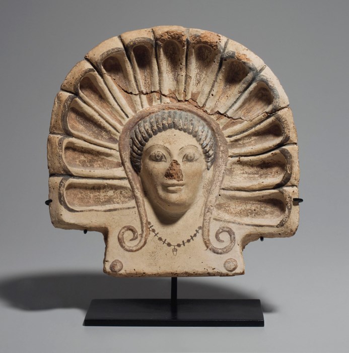 AN ETRUSCAN TERRACOTTA ANTEFIX