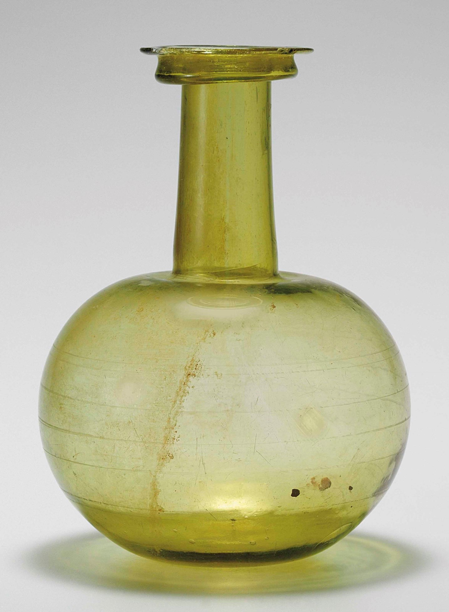 A ROMAN GLASS BOTTLE , CIRCA LATE 1ST-2ND CENTURY A.D. | Christie's