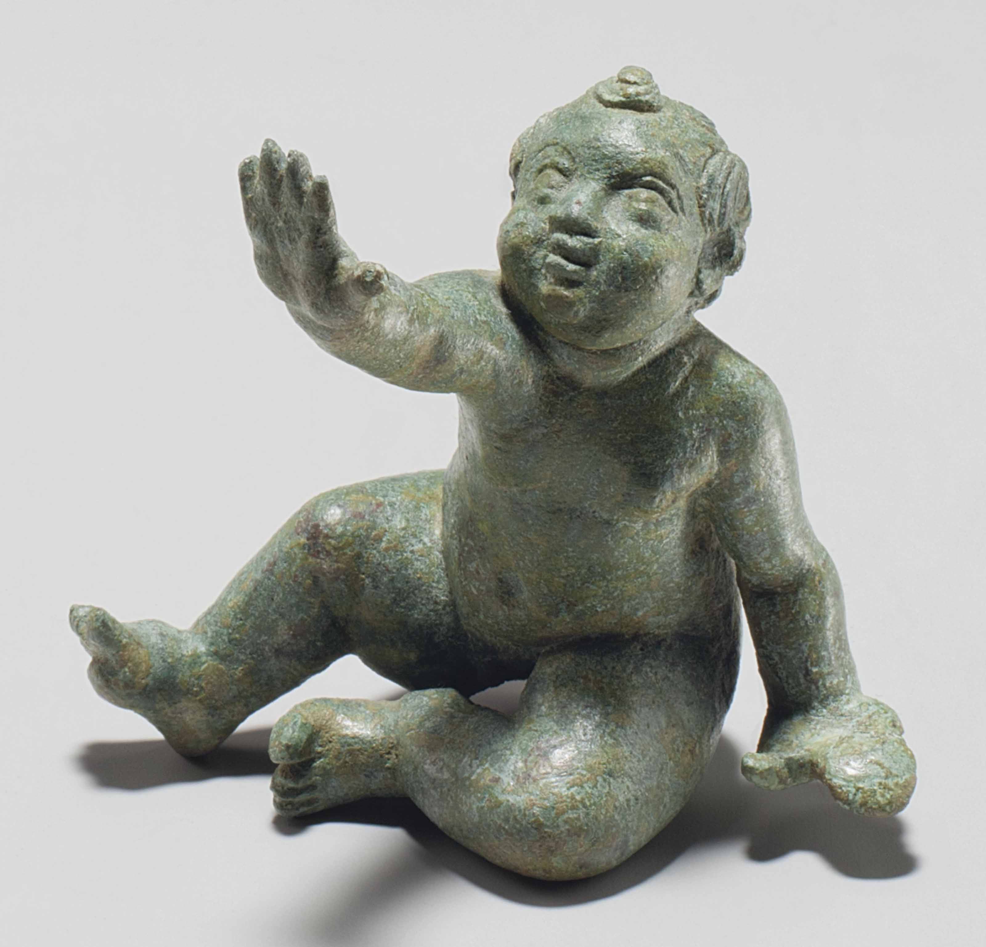 A ROMAN BRONZE INFANT , CIRCA 1ST CENTURY A.D. | Christie's