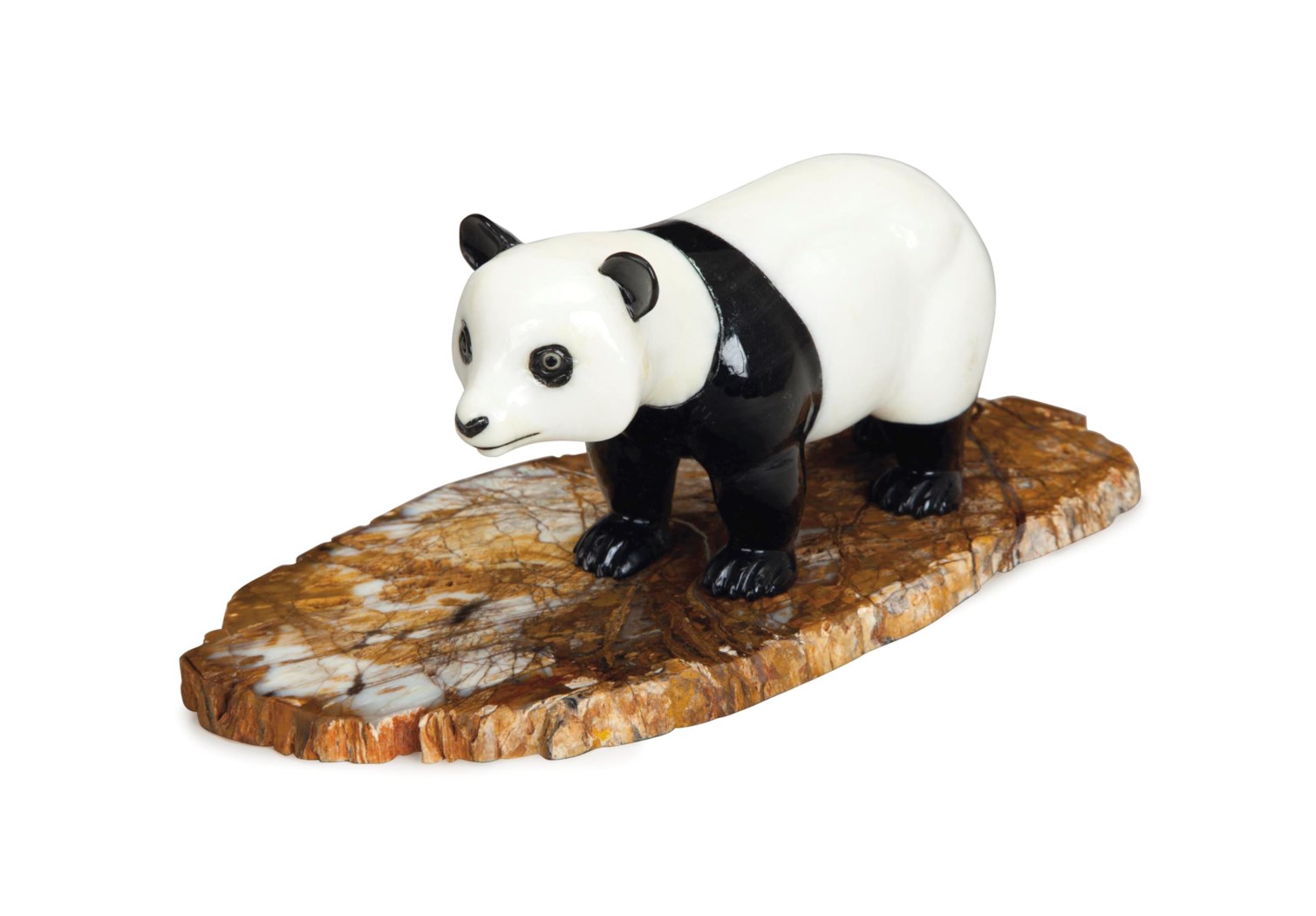 AN AMERICAN HARDSTONE MODEL OF A PANDA ON A STONE BASE, , THE PANDA ...