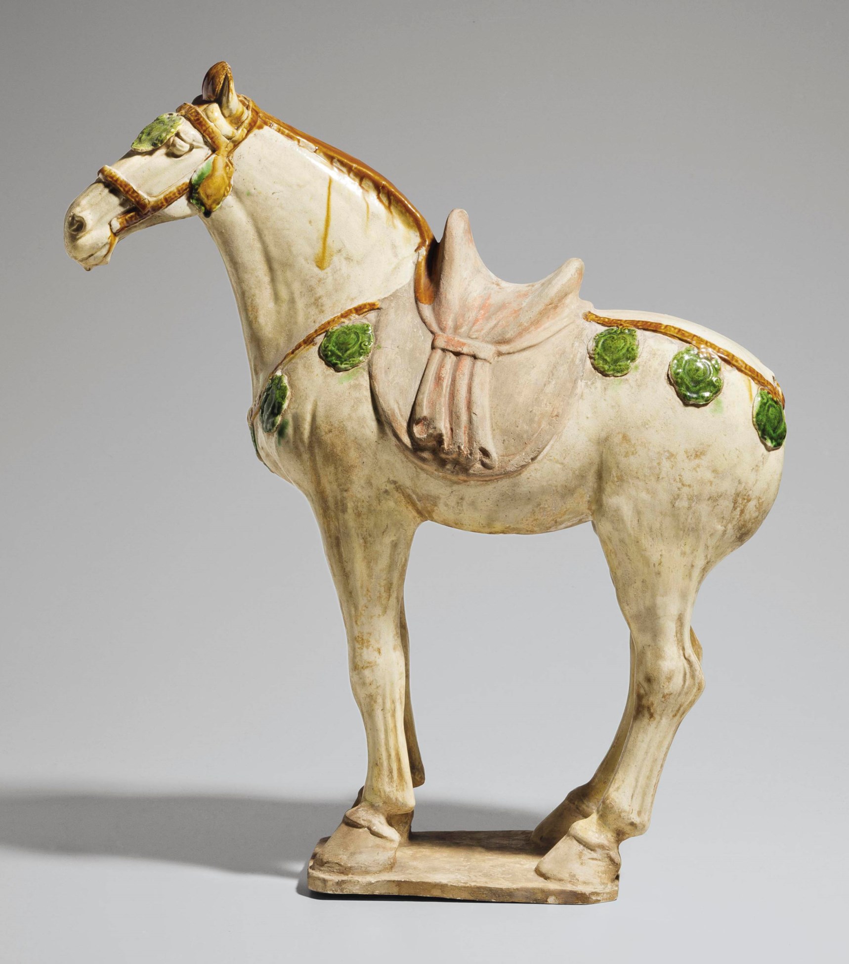 A SANCAI-GLAZED POTTERY FIGURE OF A HORSE , TANG DYNASTY (618-907 ...