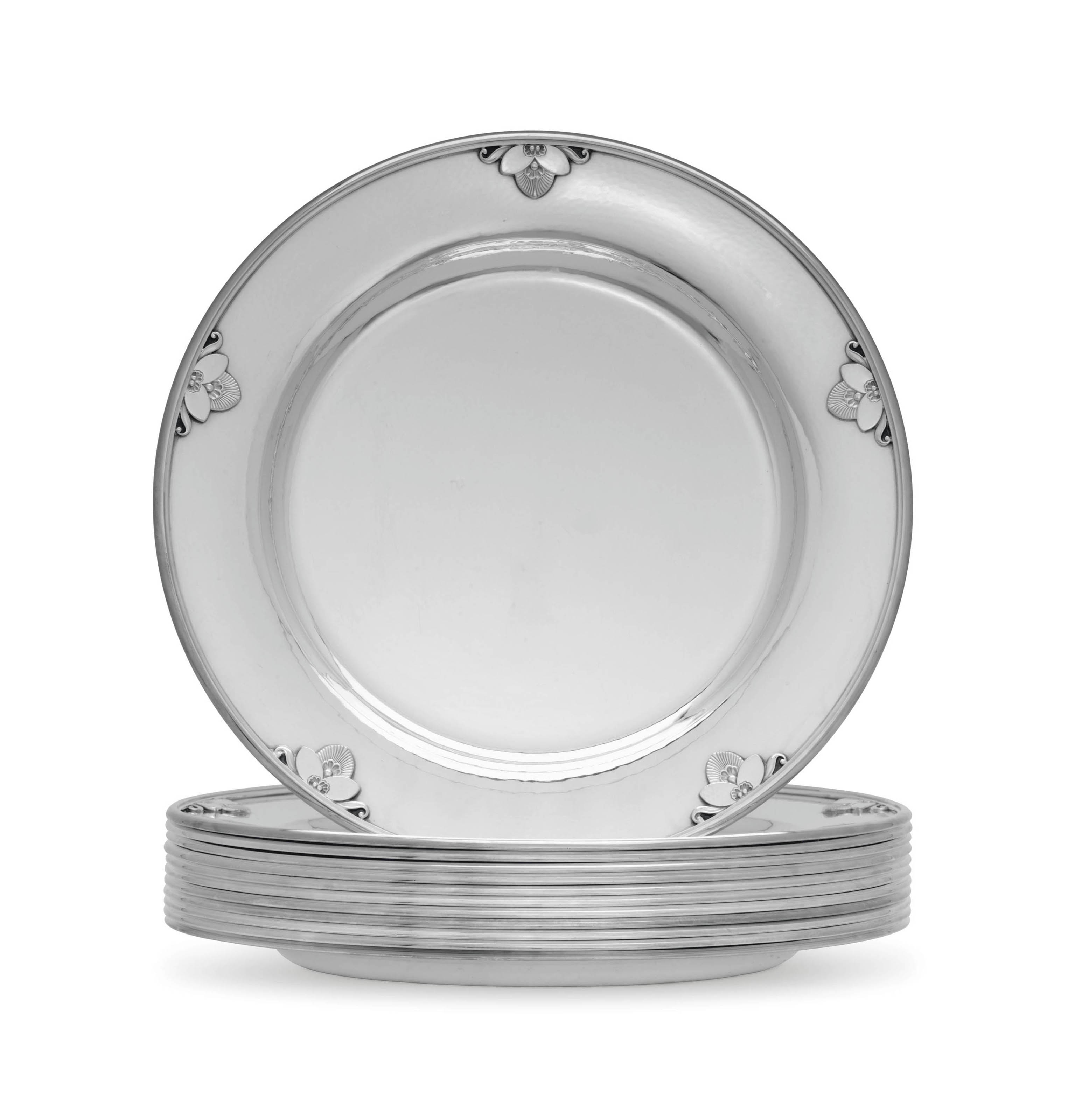 A SET OF TWELVE DANISH SILVER DINNER PLATES, DESIGNED BY GUNDORPH ALBERTUS