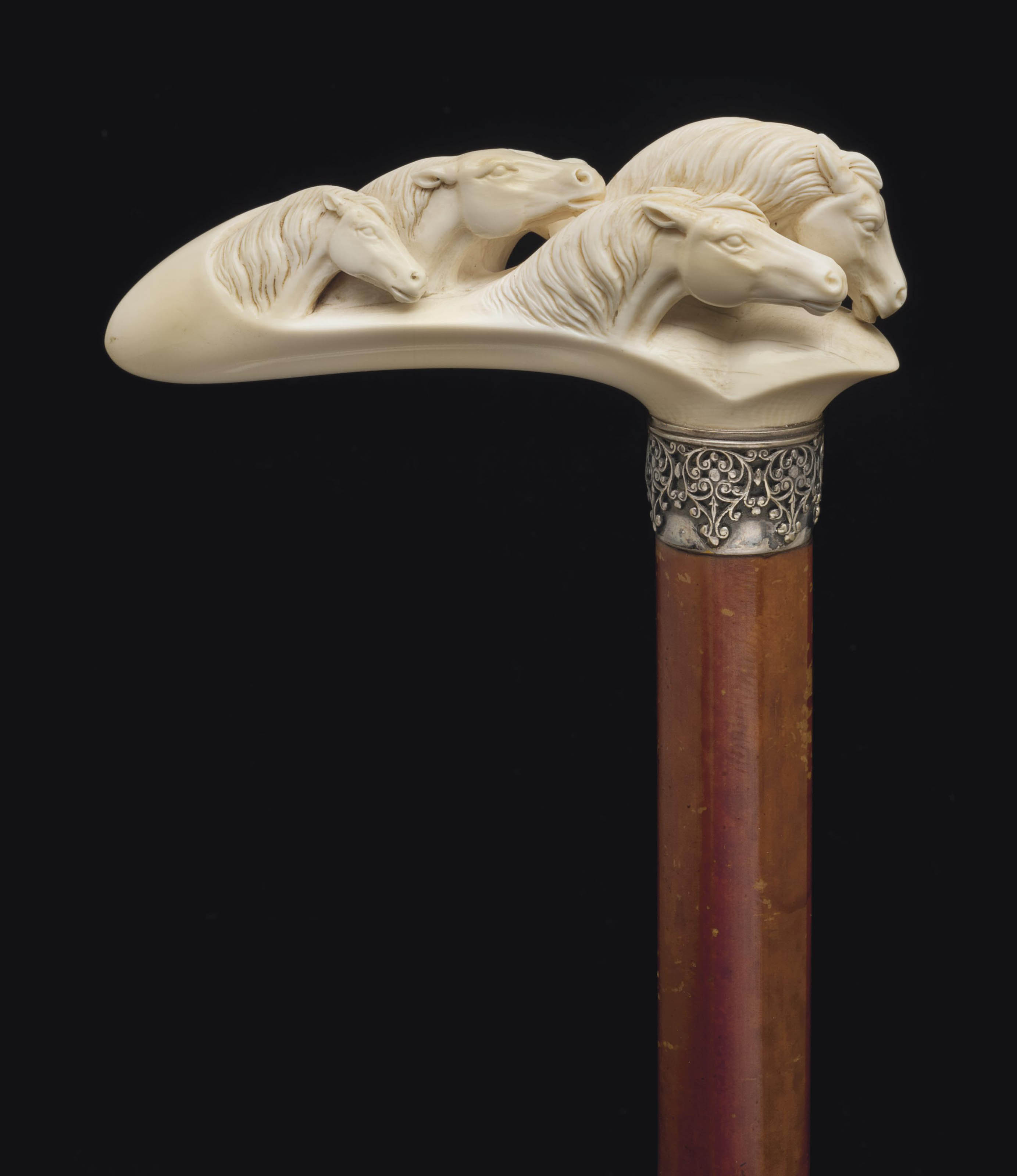A VICTORIAN IVORY ANIMAL CANE
