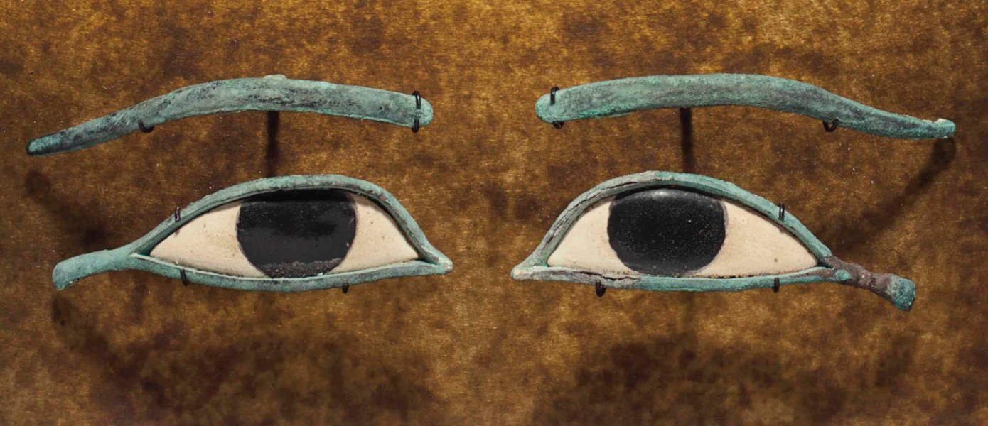 A PAIR OF EGYPTIAN BRONZE EYE AND BROW INLAYS , THIRD INTERMEDIATE ...