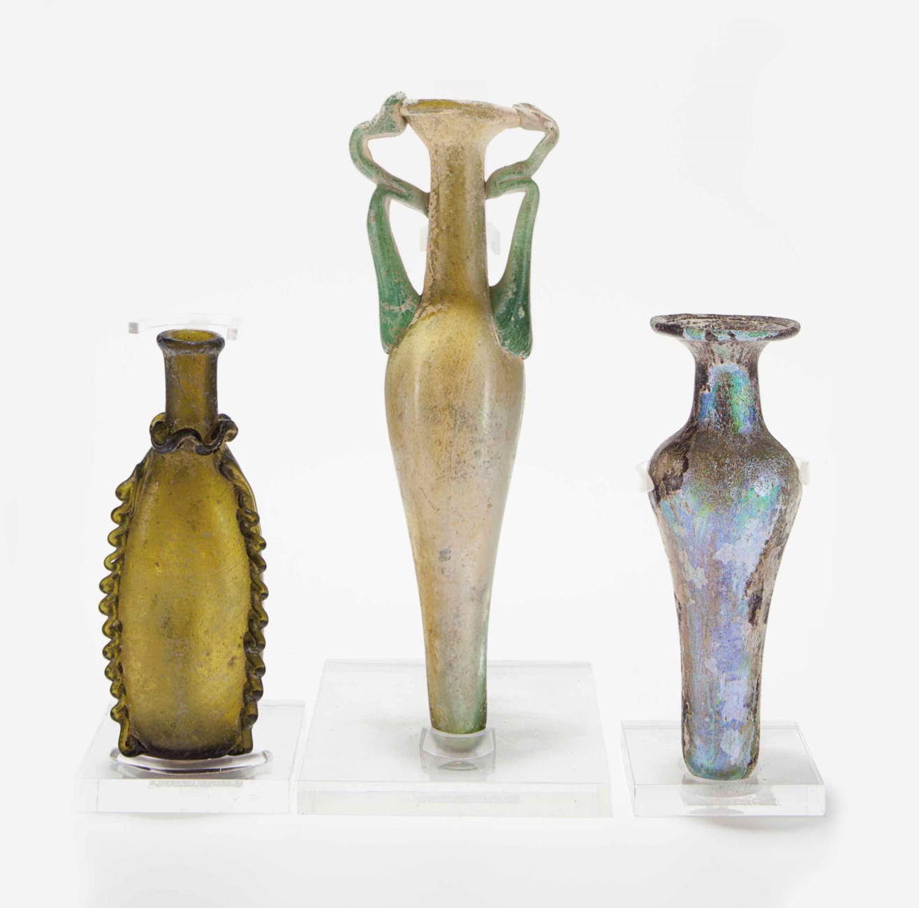 THREE ROMAN GLASS VESSELS