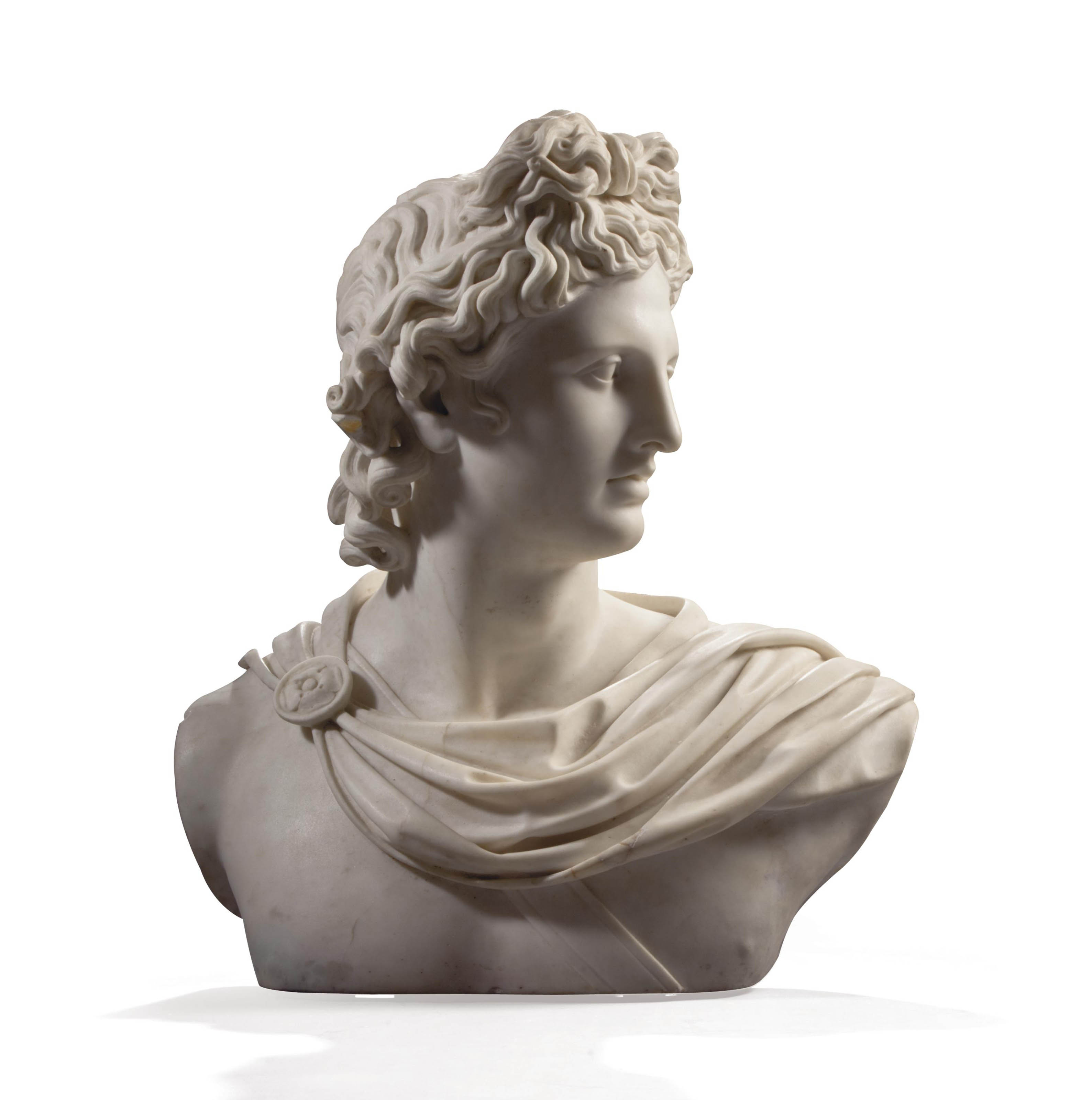 A WHITE MARBLE BUST OF APOLLO , AFTER THE MODEL BY CANOVA, 19TH CENTURY ...