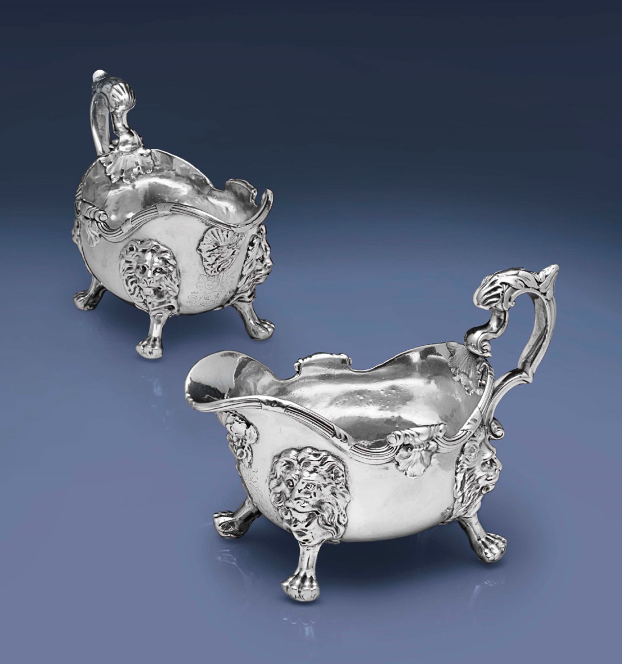 A FINE PAIR OF GEORGE II SILVER SAUCEBOATS , MARK OF PAUL DE LAMERIE ...