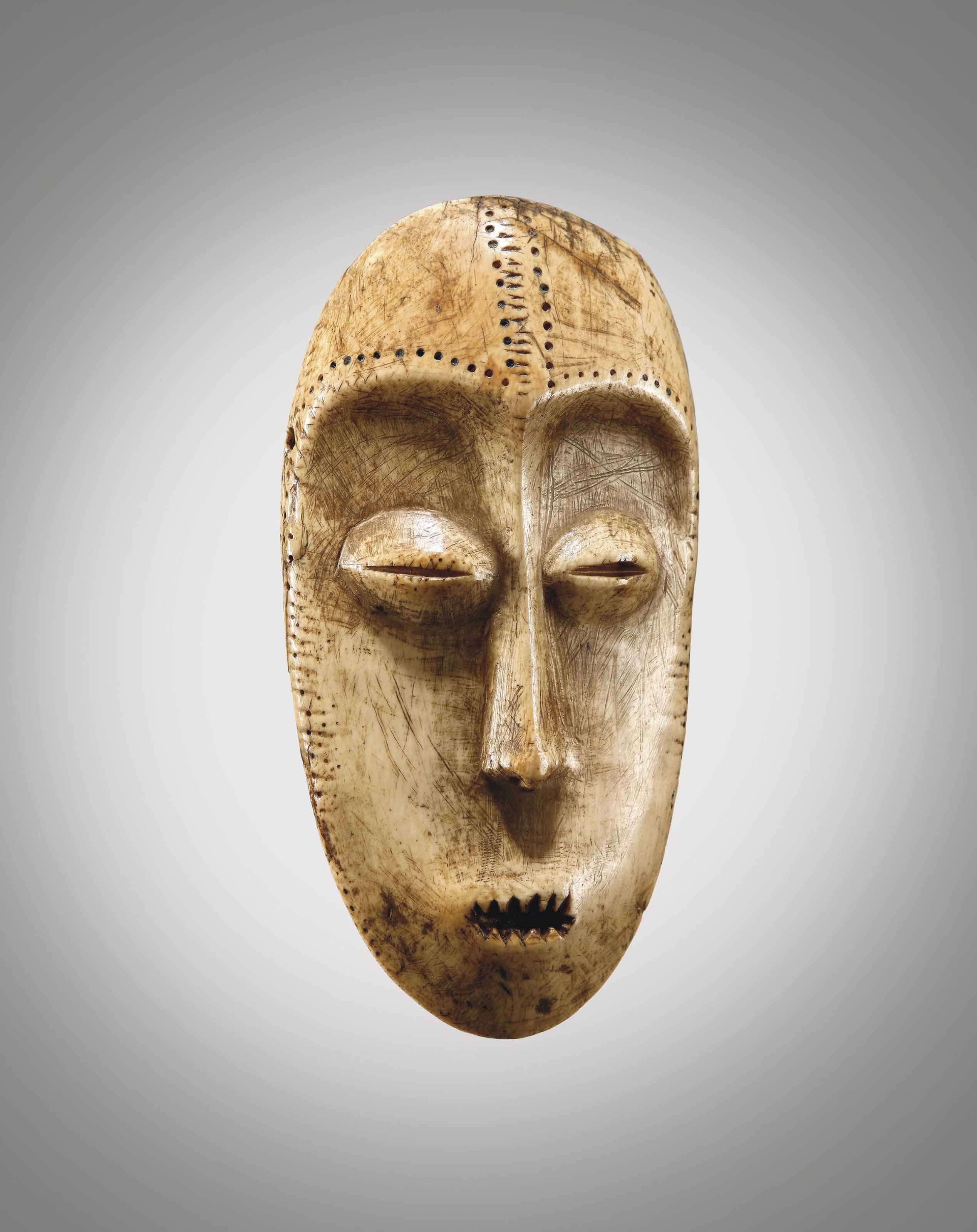 LEGA IVORY MASK, DEMOCRATIC REPUBLIC OF CONGO , IDUMU | Christie's