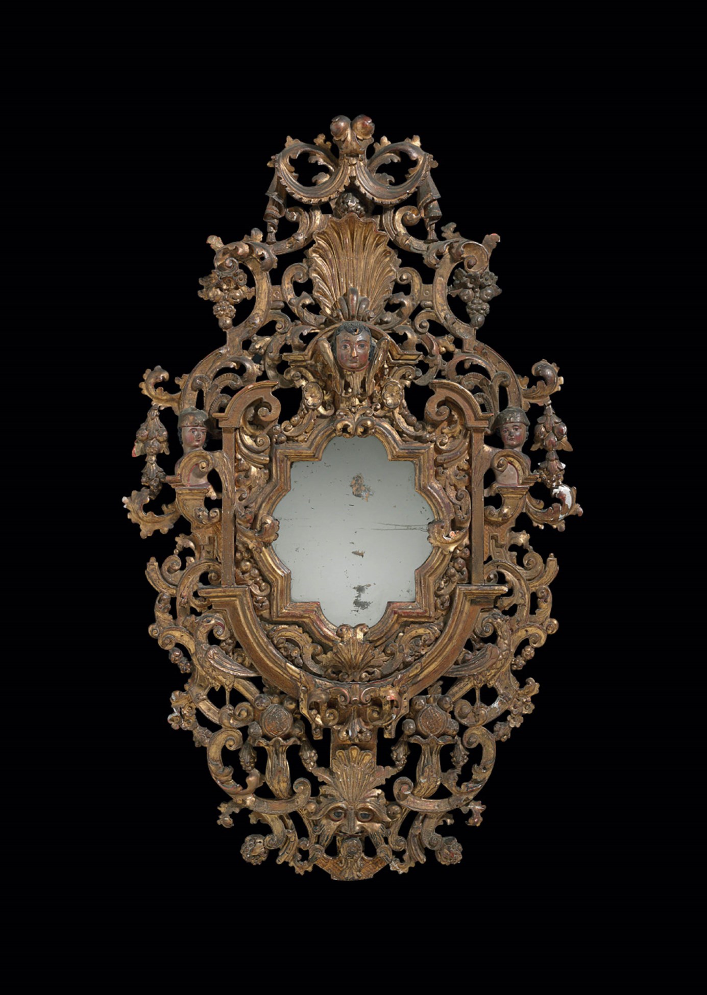 A SPANISH COLONIAL GILTWOOD AND POLYCHROME-DECORATED MIRROR , 18TH ...
